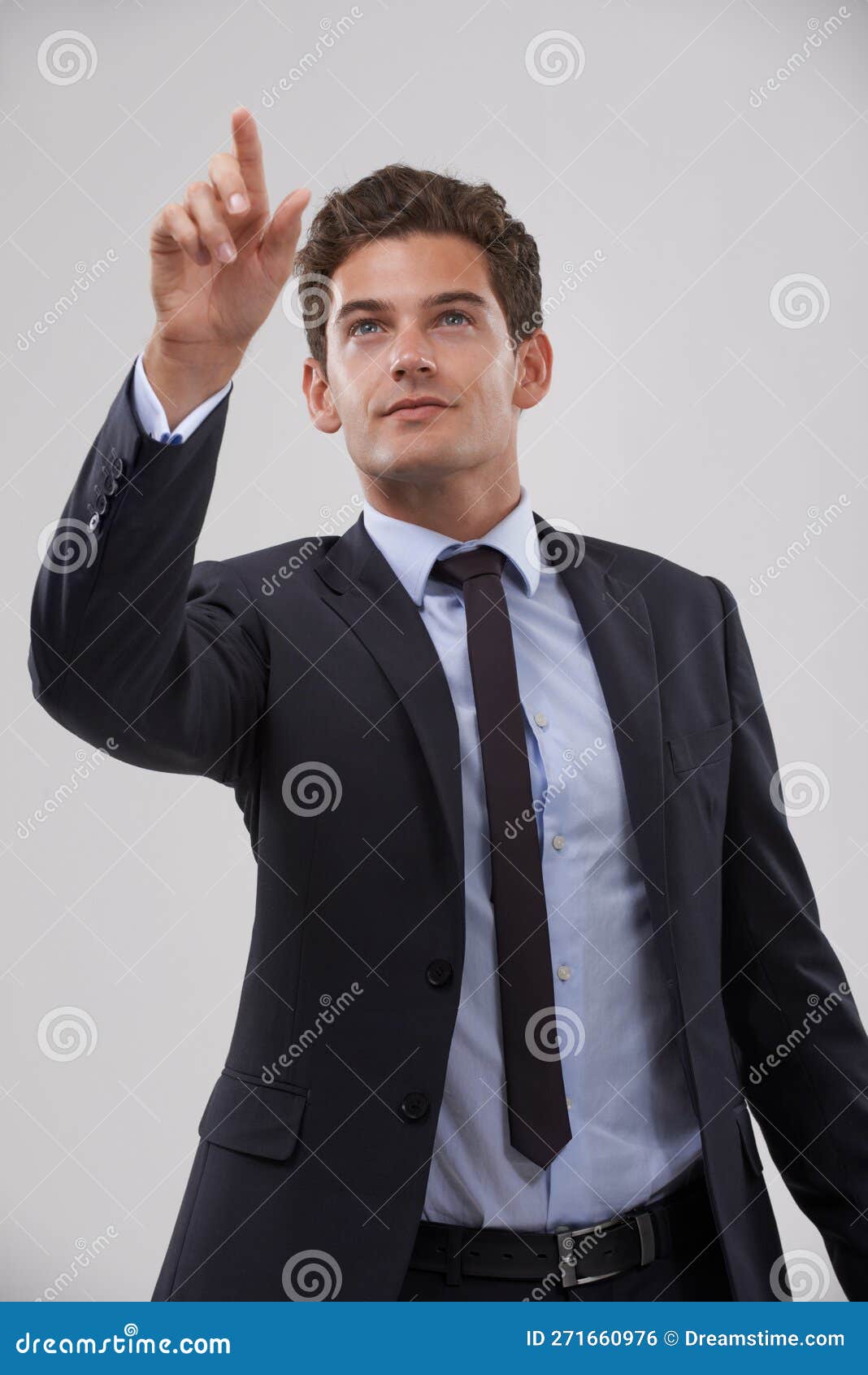 Thats Where Im Aiming for. a Handsome Young Businessman Pointing. Stock ...