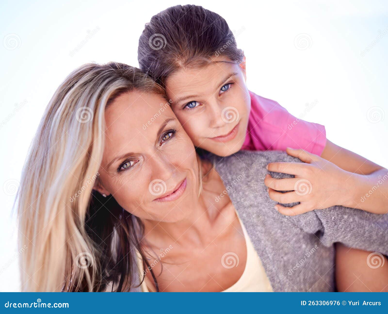 Their Bond Is Undeniable A Smiling Mother With Her Daughter On Her