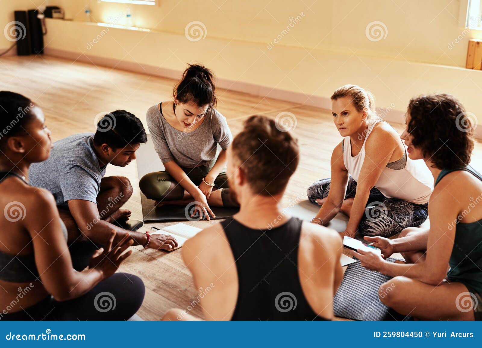 Their Schedule is As Synchronised As Their Yoga Routine. a Group of ...