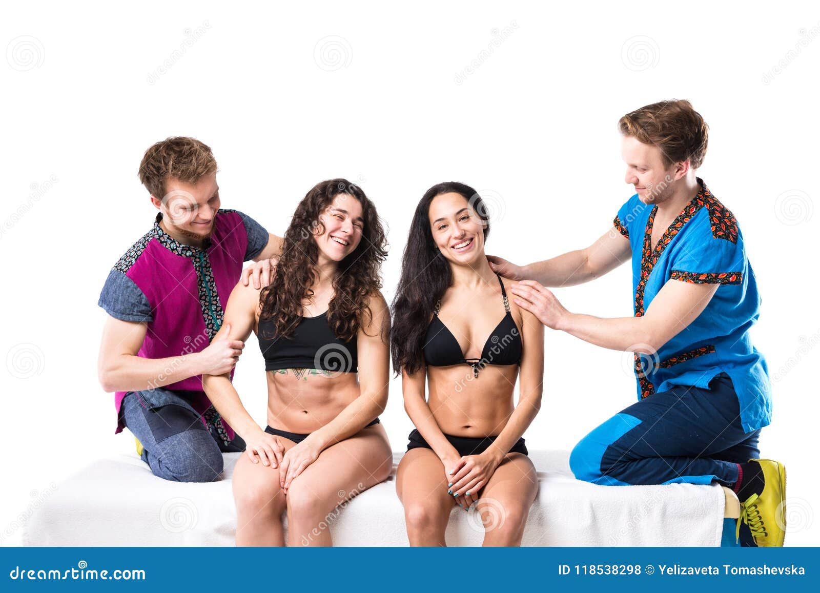 Theme Massage And Body Care Two Male Caucasian Twin Brothers In Uniform Doing Shoulder Massage