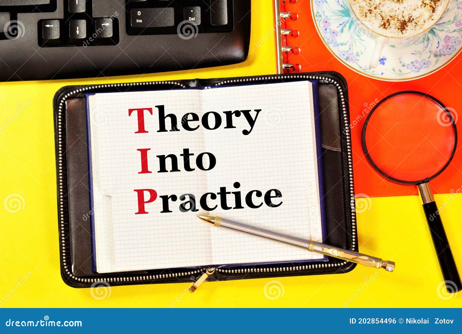 Theory into Practice. Text Label in the Planning Notepad Stock Photo ...