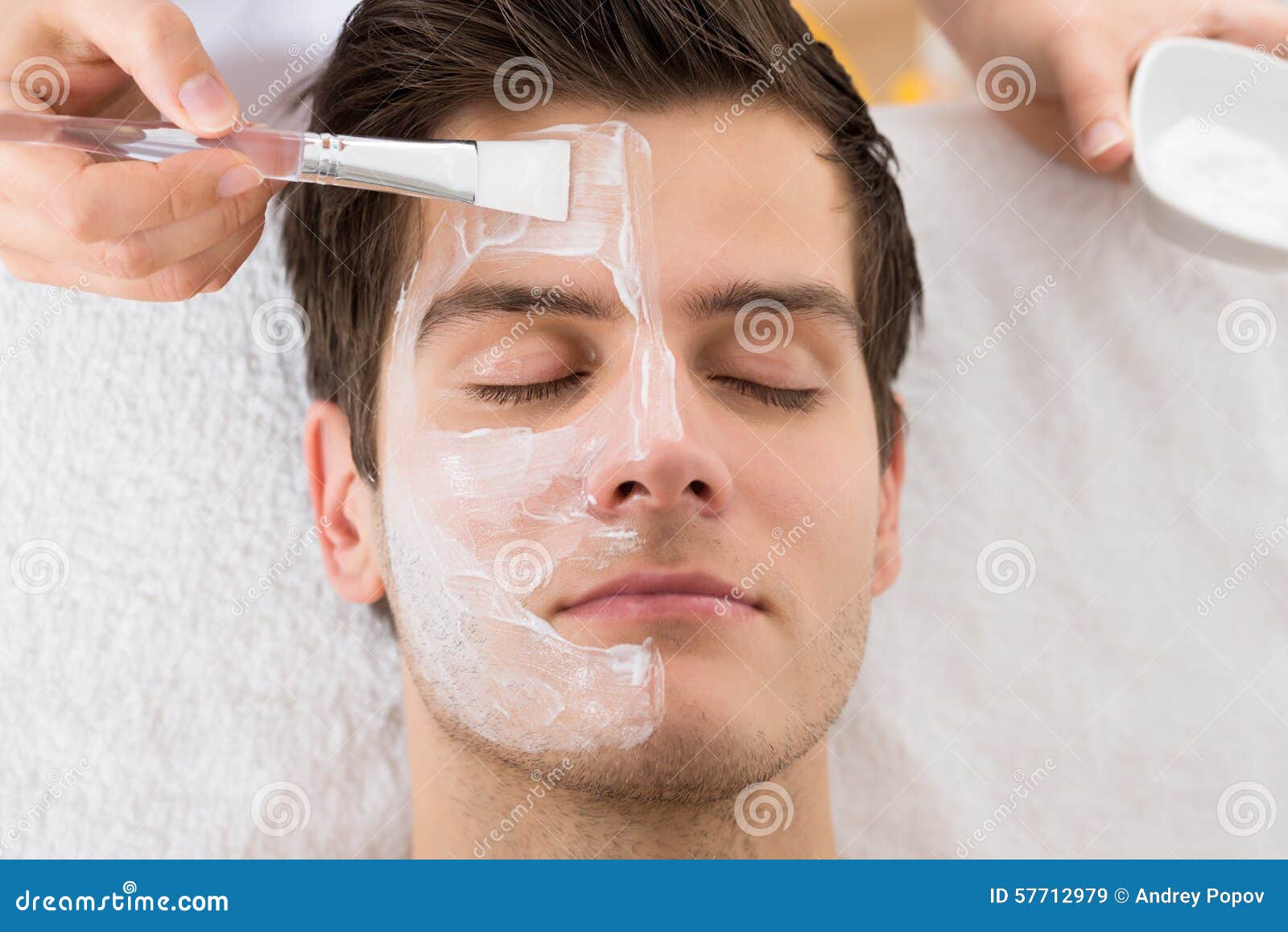 Therapist Applying Face Mask To Man Stock Image - Image of centre ...