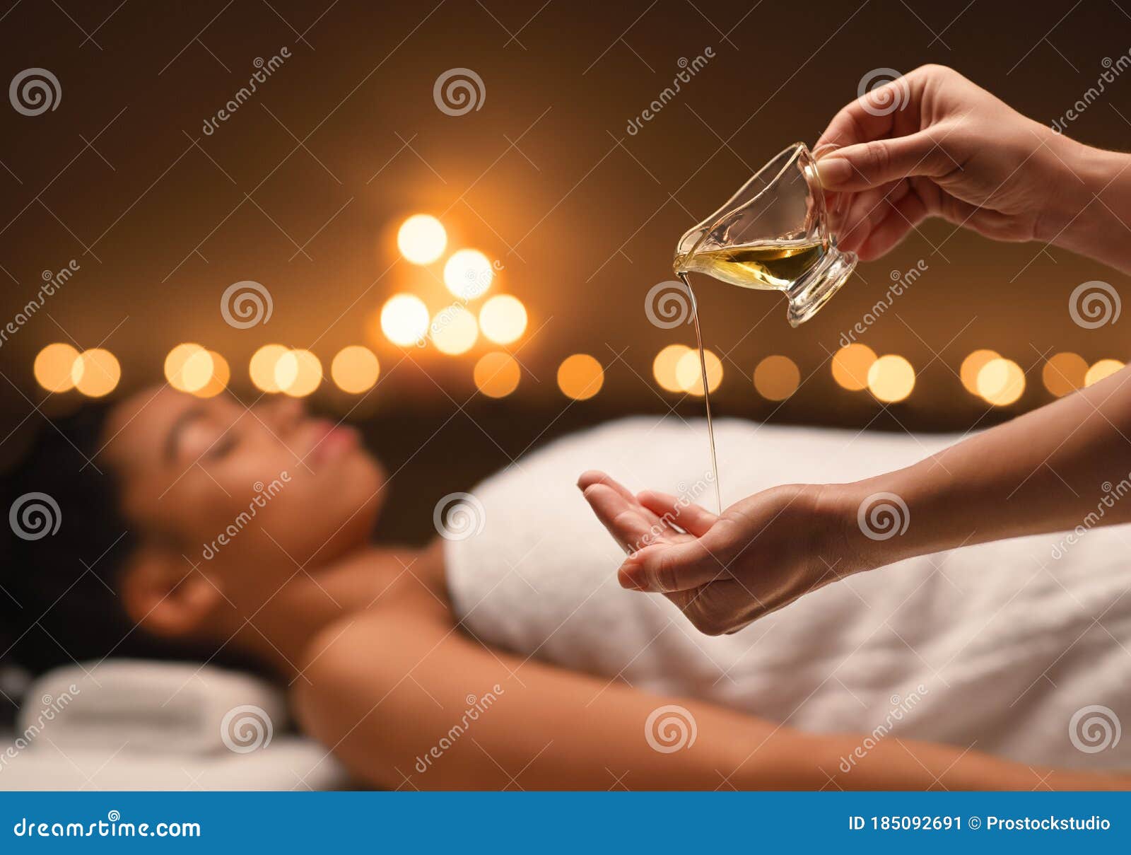 Therapist Applying Massage Oil On Hands Before Therapy Stock Image Image Of Aromatic