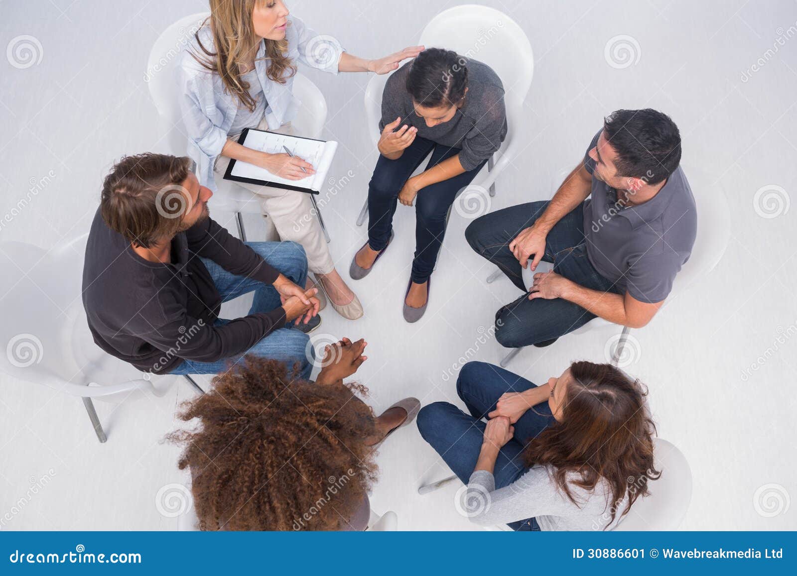 Therapist Comforting Her Patient Crying Stock Image - Image of ...