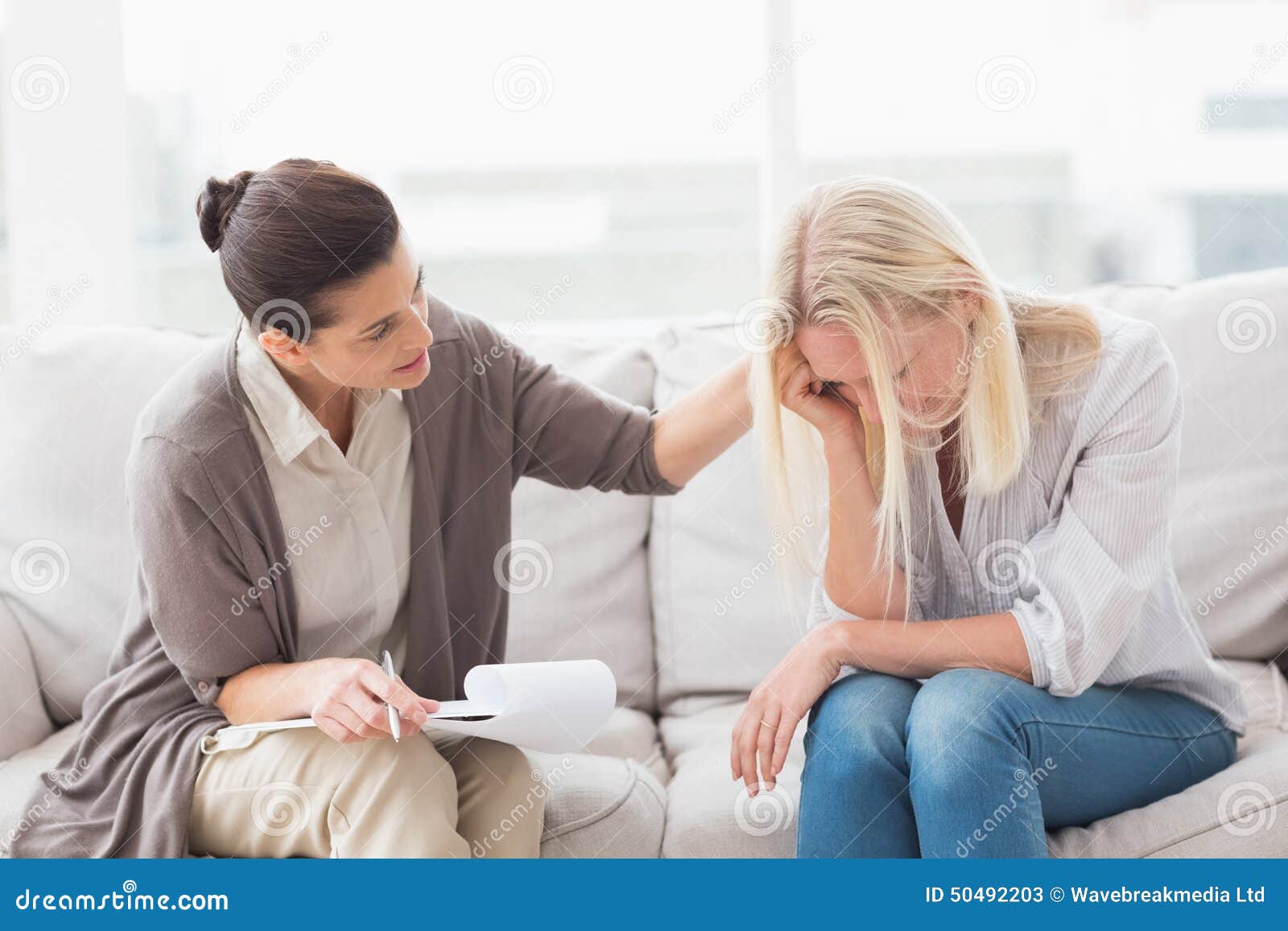 Therapist Comforting Upset Woman On Sofa Stock Image Image Of Length