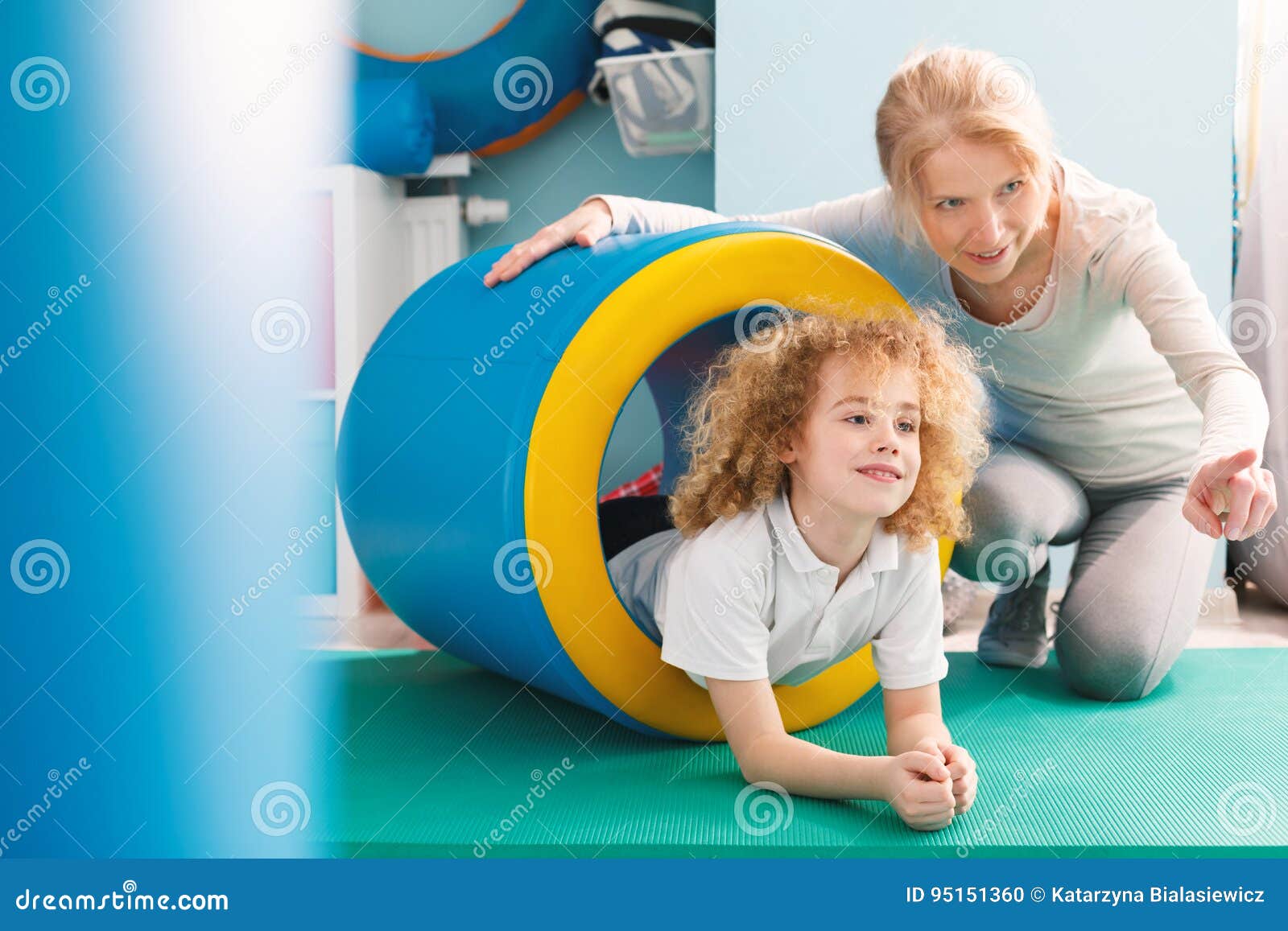 Therapist Explaining Exercise To a Boy Stock Photo - Image of hair ...