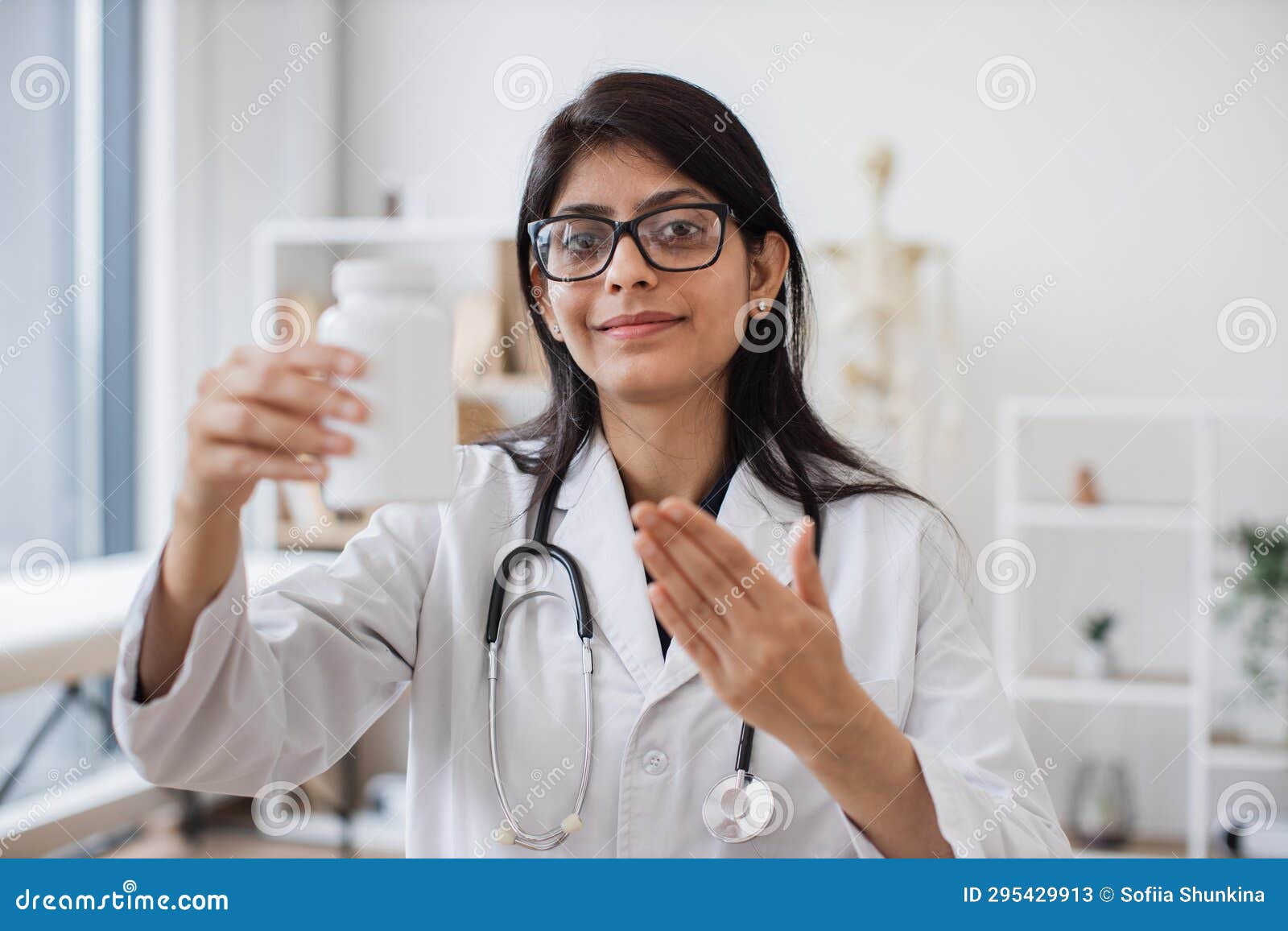 Therapist in Lab Coat Standing with Pill Bottle in Hand Stock Image ...