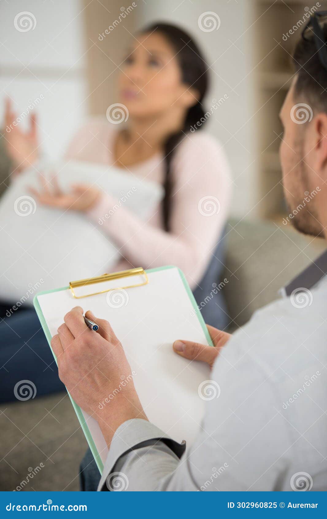 Therapist Making Notes while Listening To Patient Stock Image - Image ...