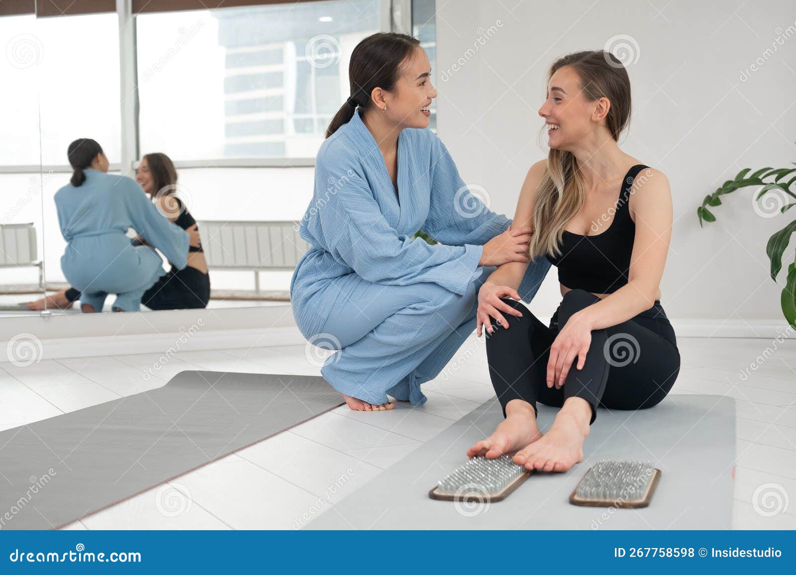 The Therapist Supports the Client after Standing on the Sadhu Boards ...