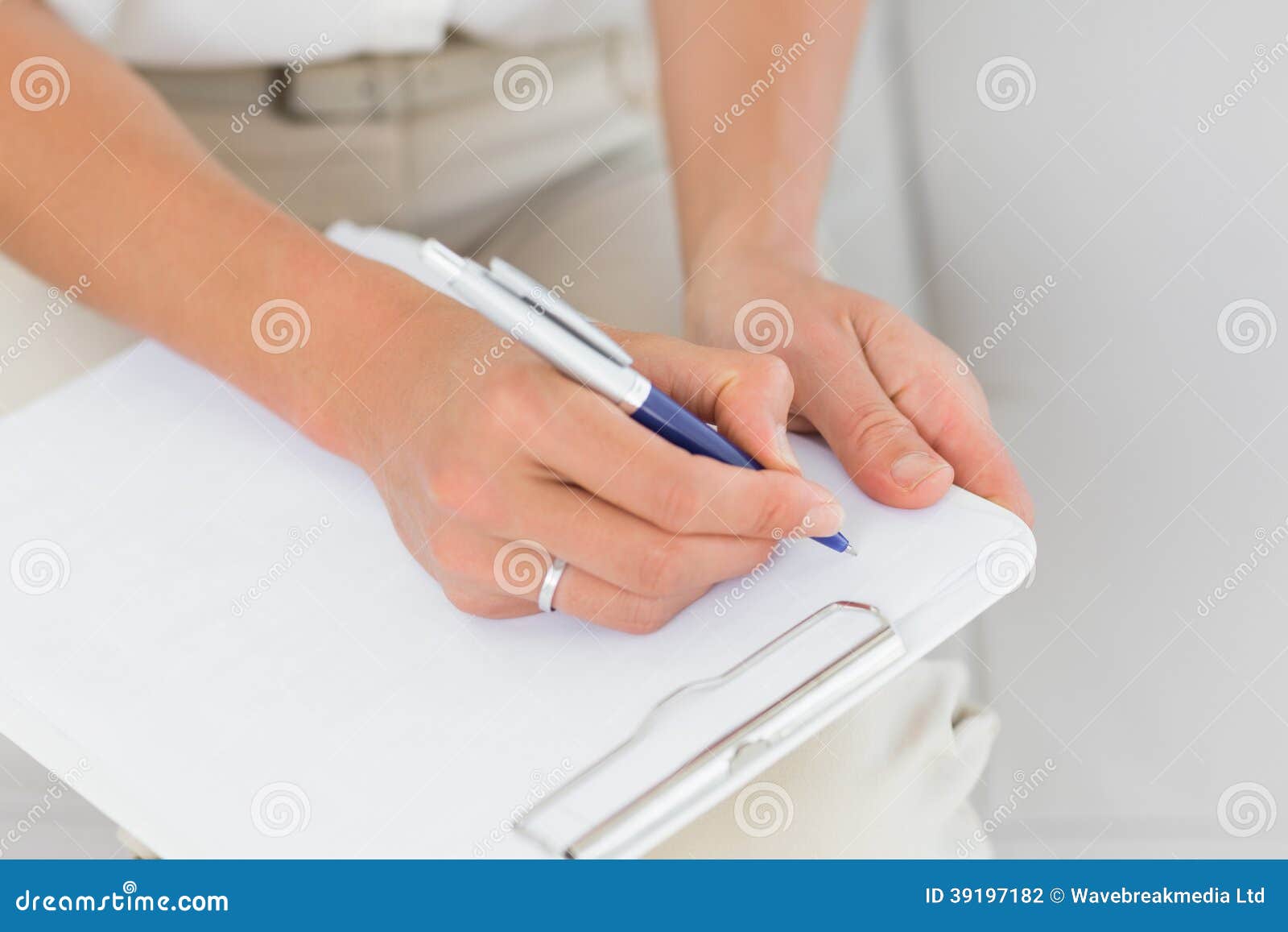 Therapist Taking Notes on Clipboard Stock Photo - Image of person ...
