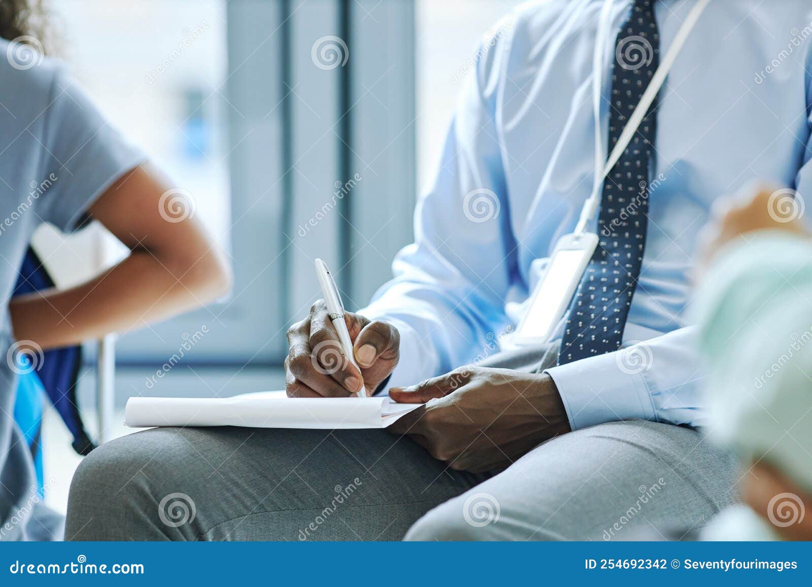 Therapist Taking Notes in Session Stock Photo - Image of male ...