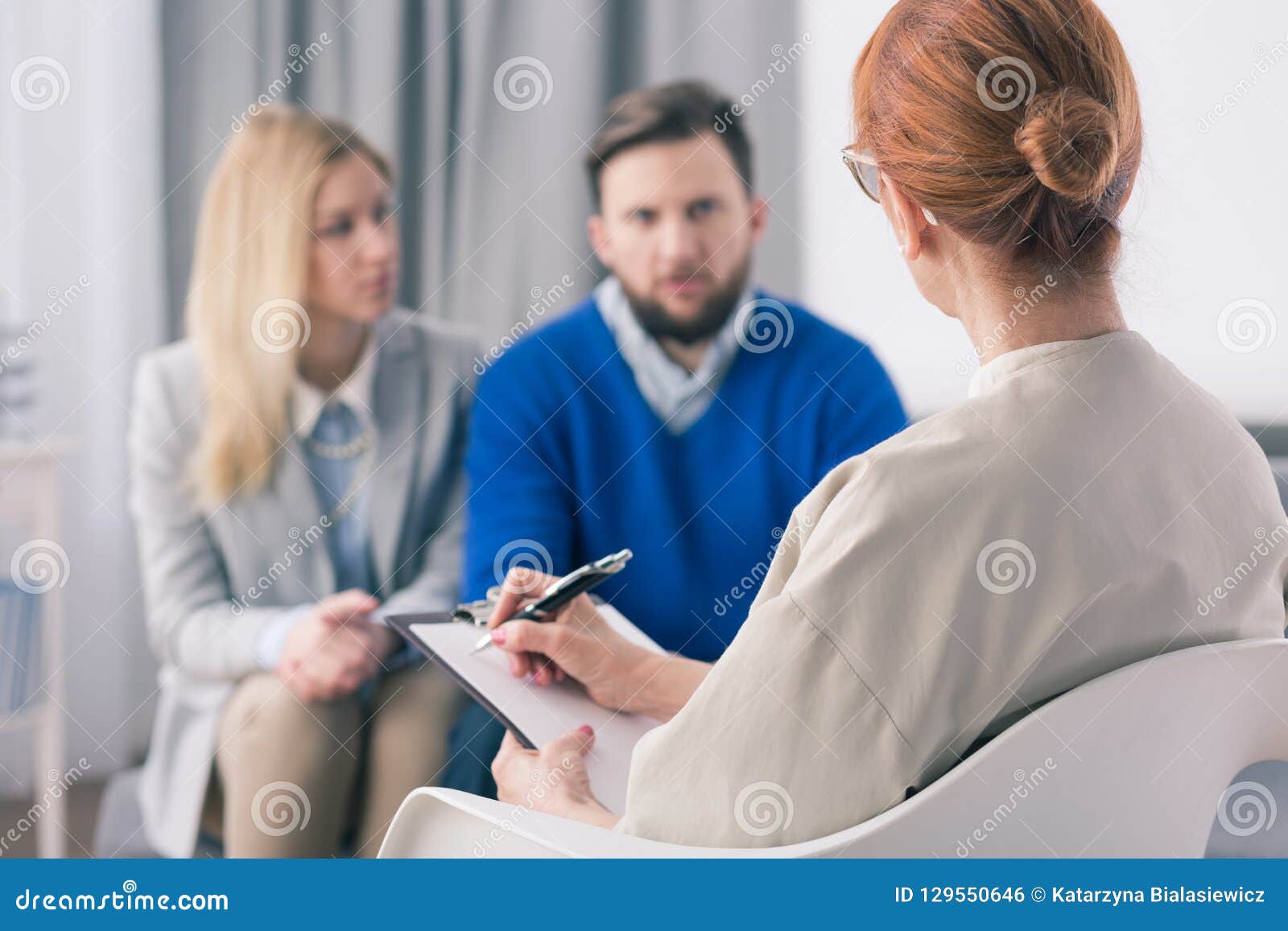 Therapist Talking To a Couple with Problems Stock Photo - Image of view ...