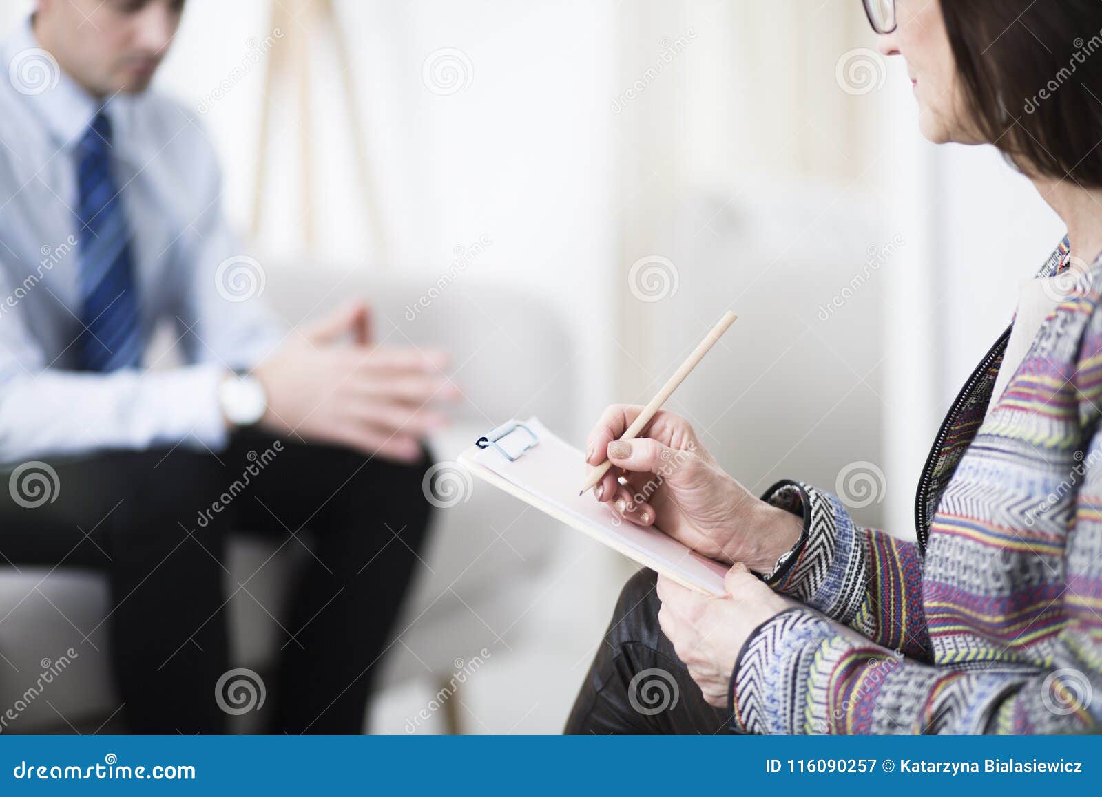 Therapist writing notes stock image. Image of overworked - 116090257