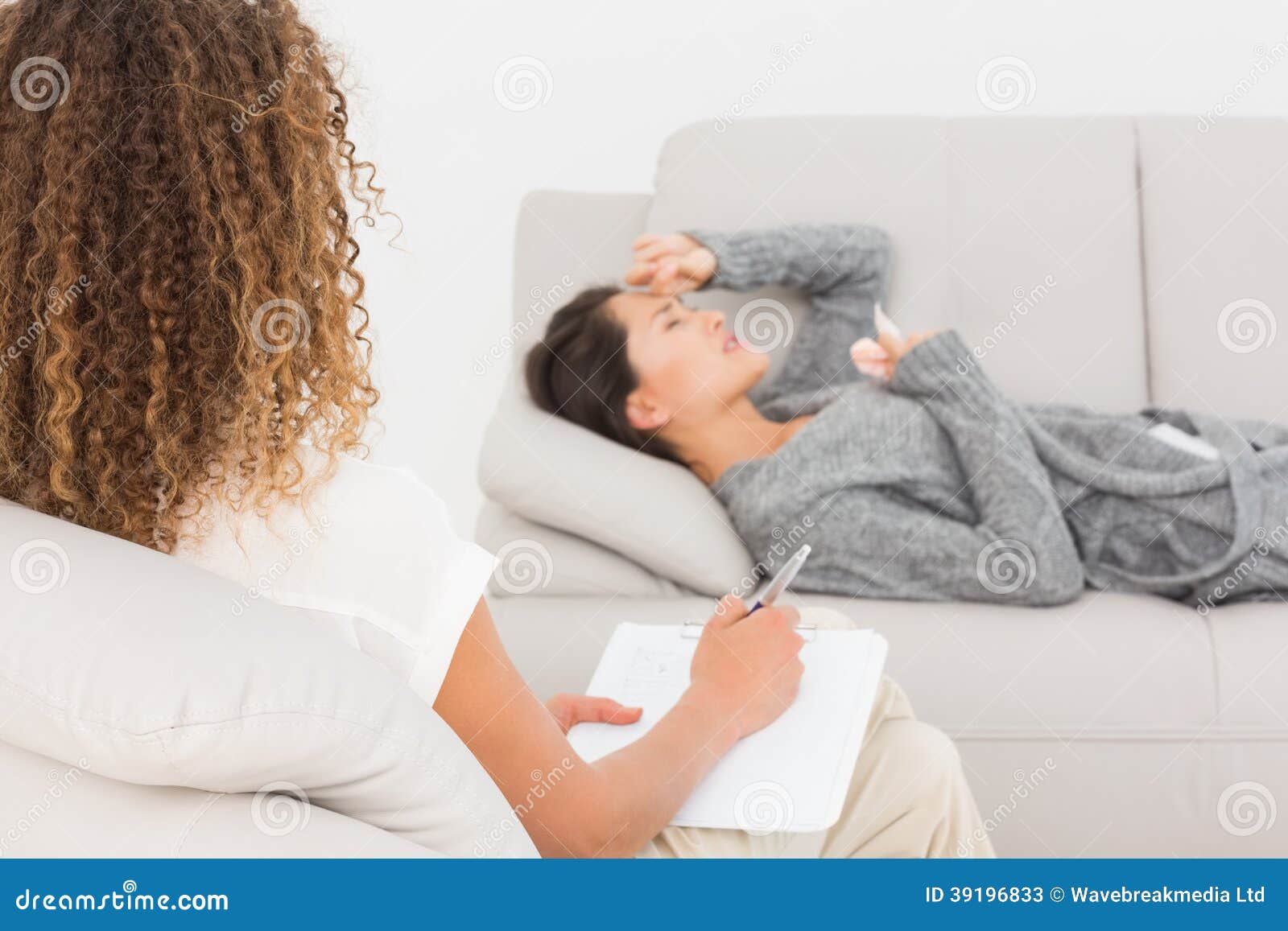 Therapist Writing Notes on Her Crying Patient on the Couch Stock Image ...
