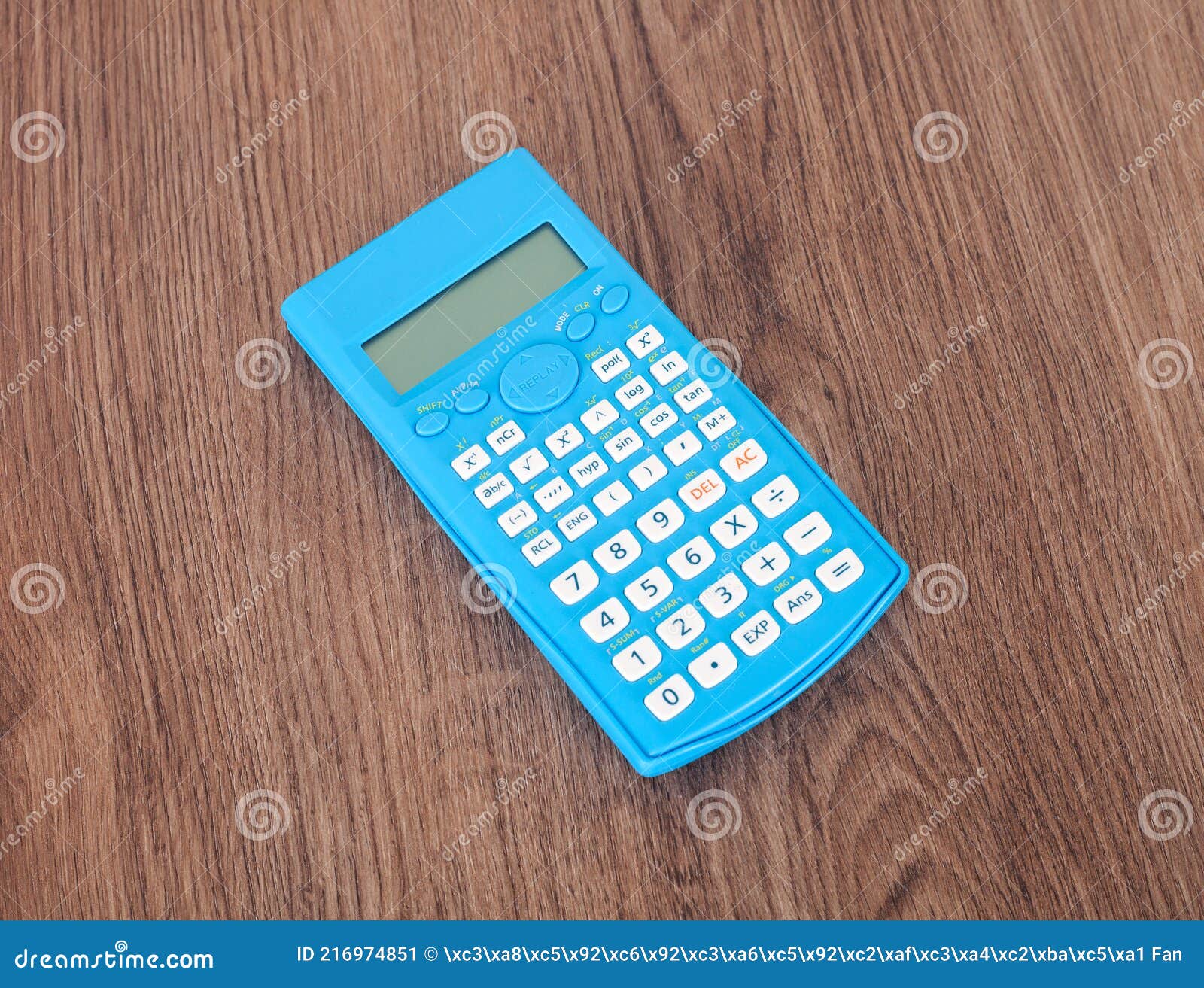 There is a Blue Calculator on the Desk Stock Image - Image of keys ...