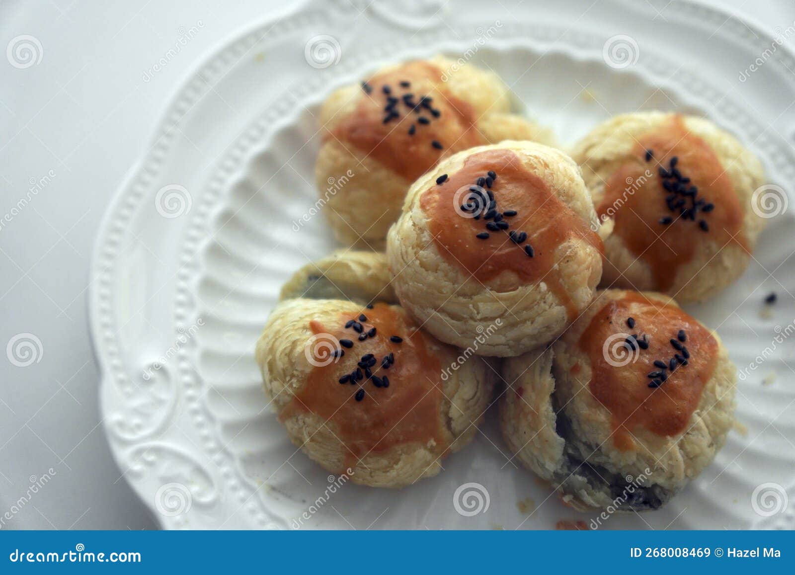 There are Five Egg Yolk Pastries with Bean Paste on the Plate Stock ...