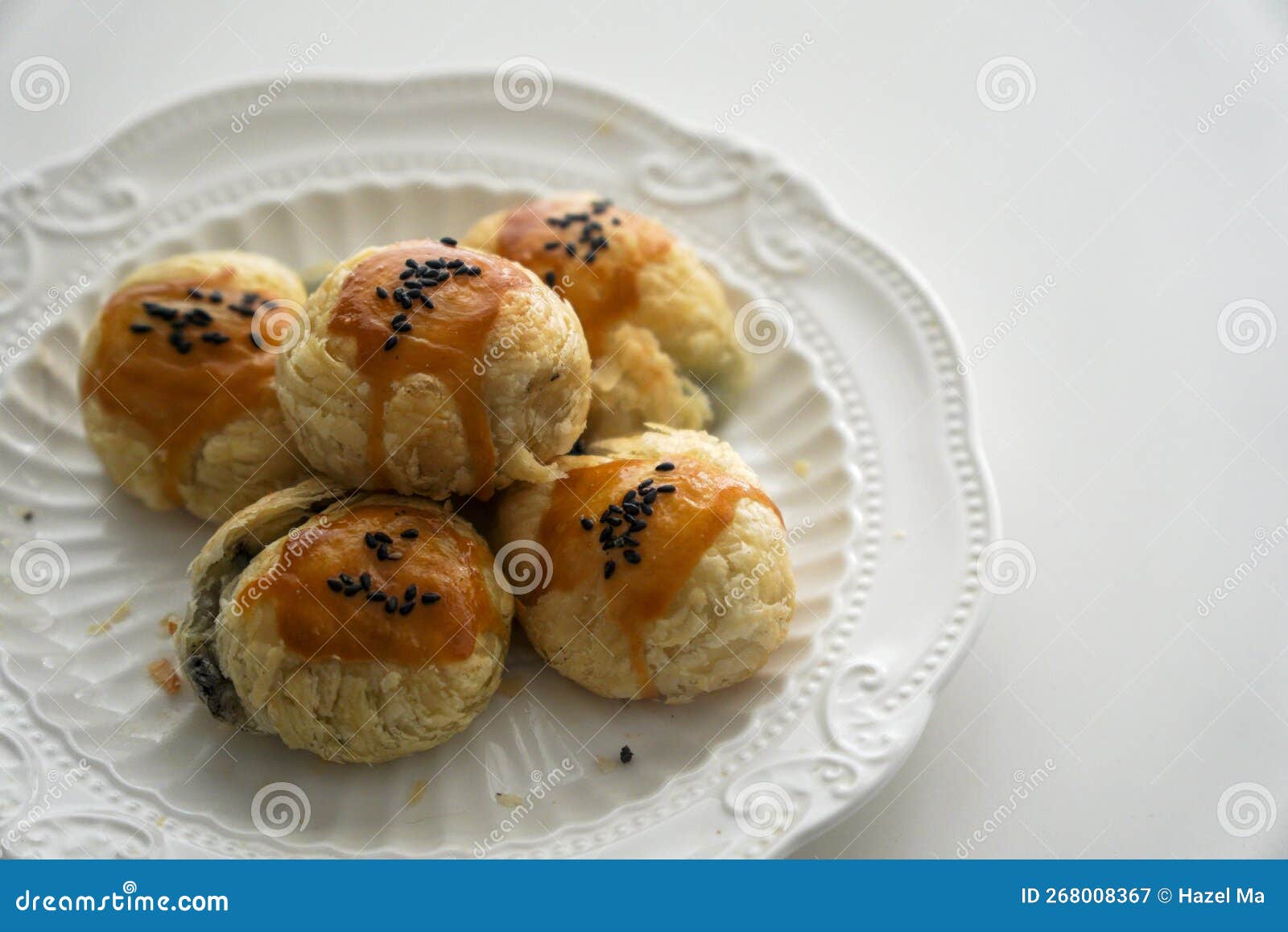 There are Five Egg Yolk Pastries with Bean Paste on the Plate Stock ...
