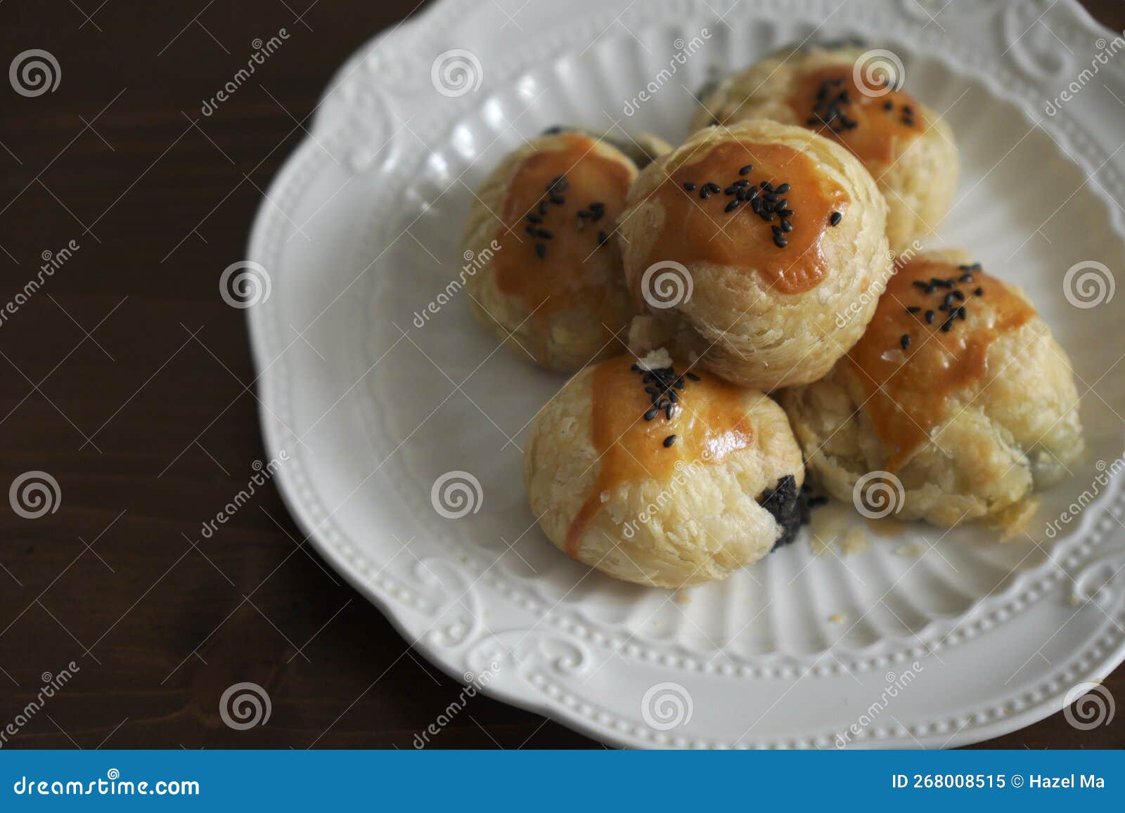 There are Five Egg Yolk Pastries with Bean Paste on the Plate Stock ...
