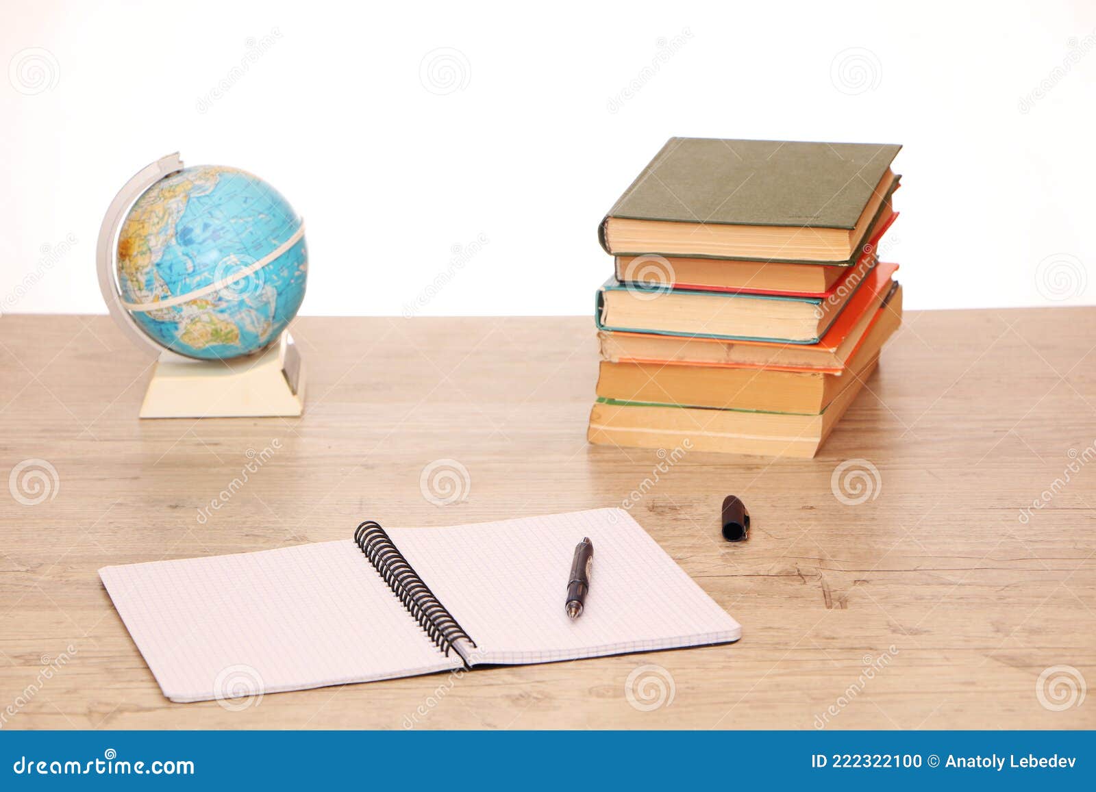 There is a Globe and Study Materials on the Table in the Library To ...