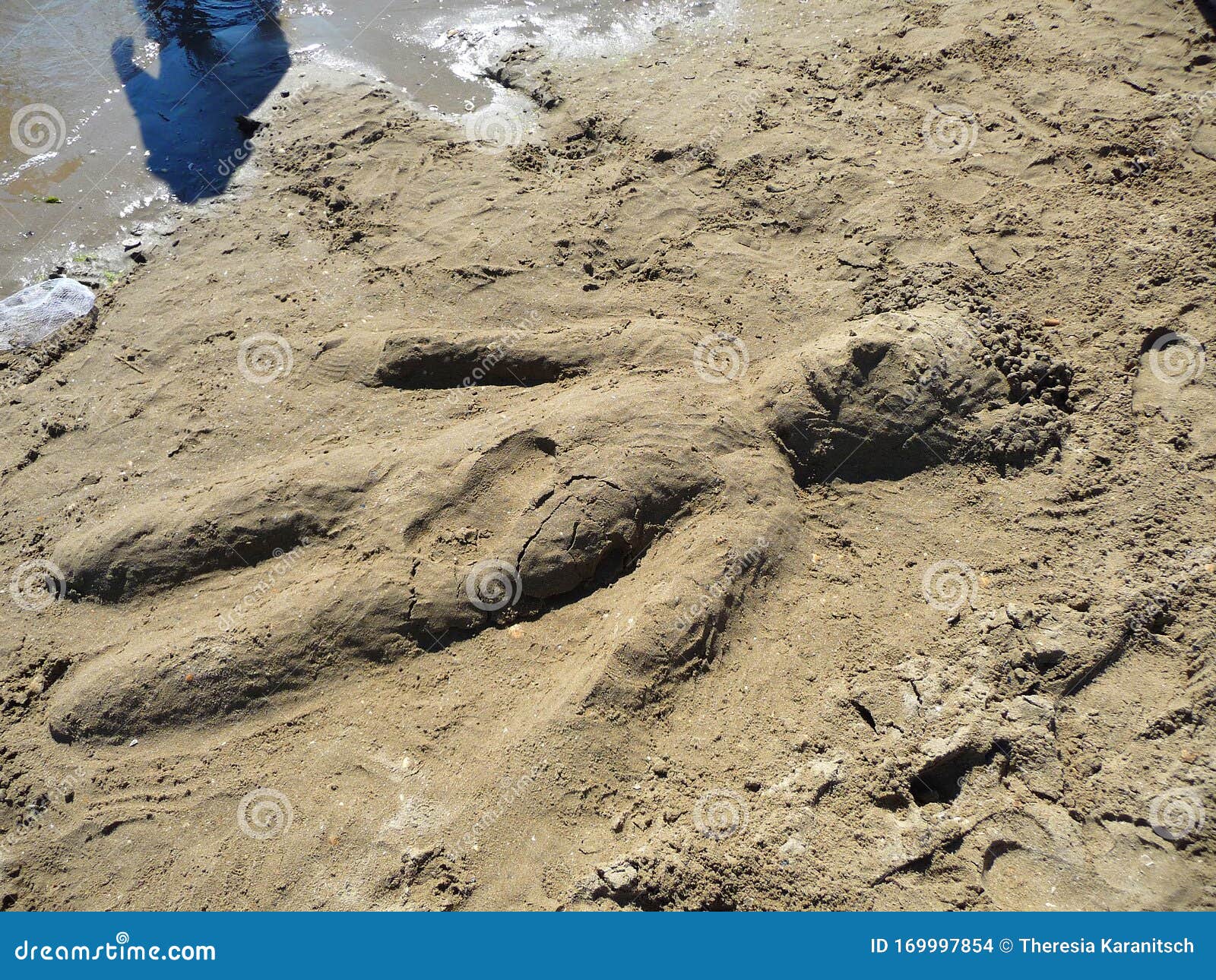 Figure from sand stock photo. Image of ocean, figure - 169997854