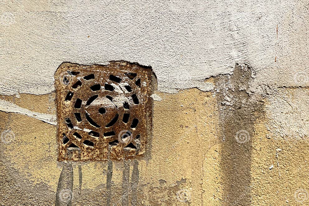 There is an Old Rusty Hatch on the Wall of the Building Stock Photo ...