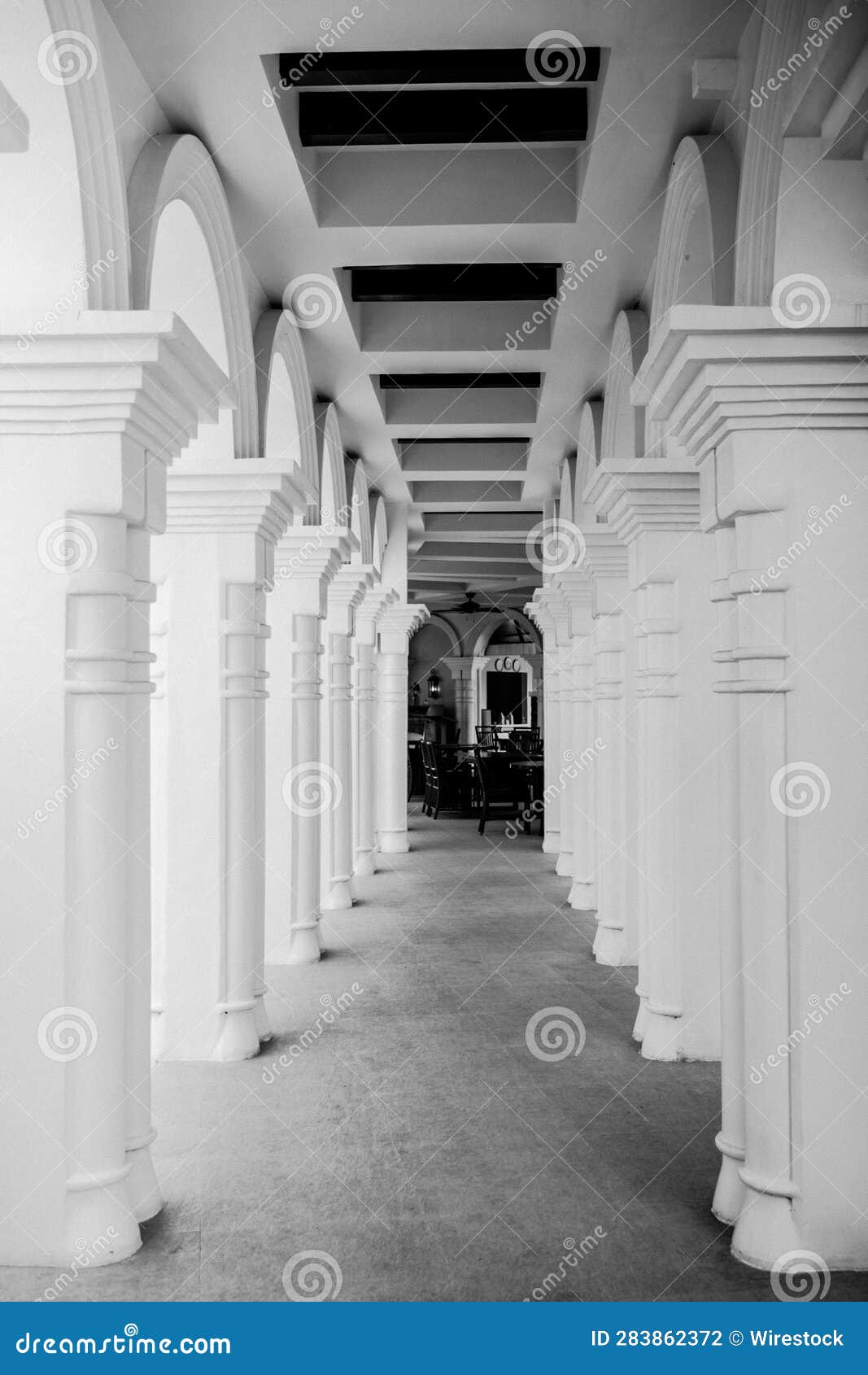 There are Several Columns in a Hallway Next To Each Other Stock Photo ...