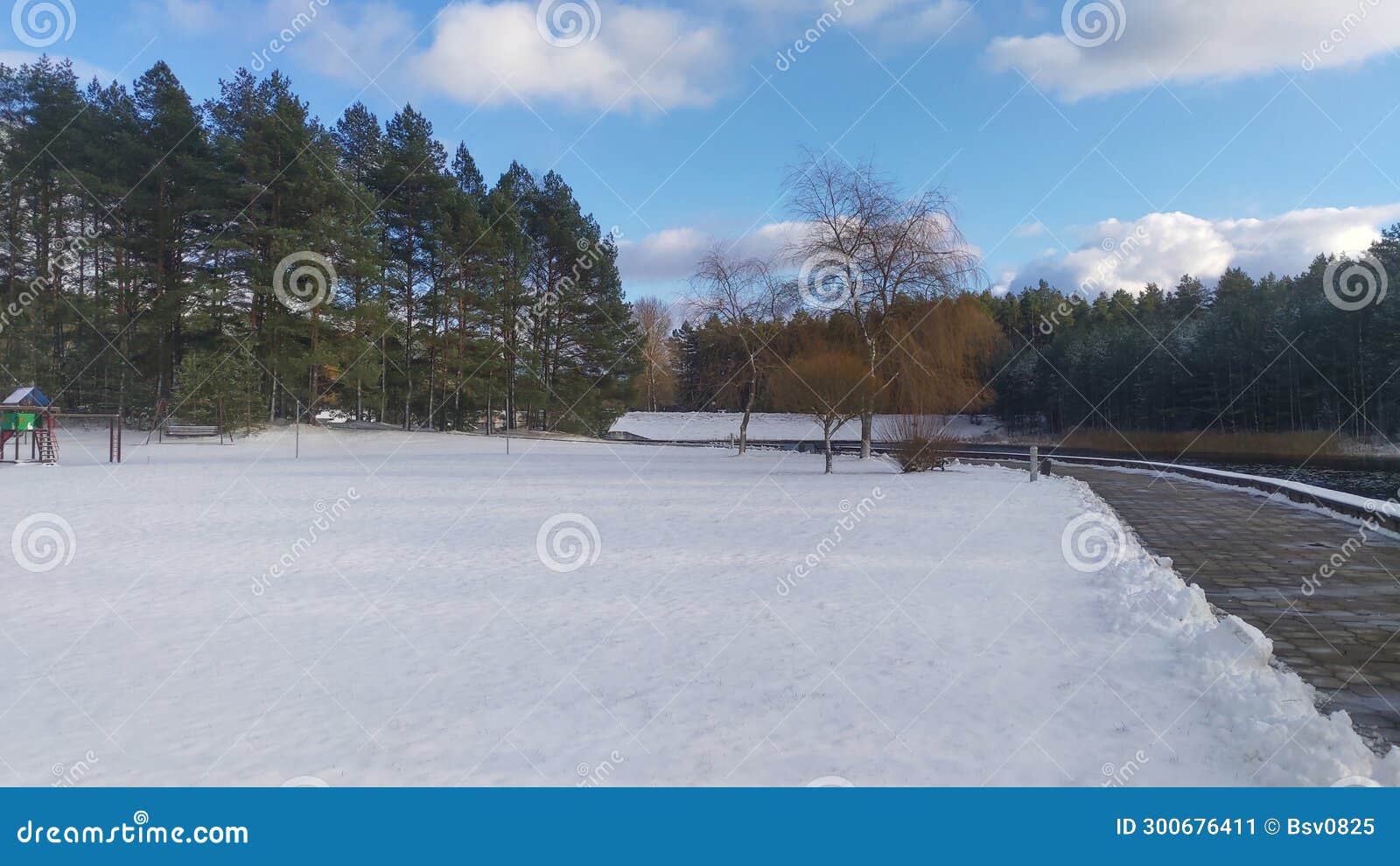 There is Snow on the Lawn, River Banks and Tree Branches after the ...