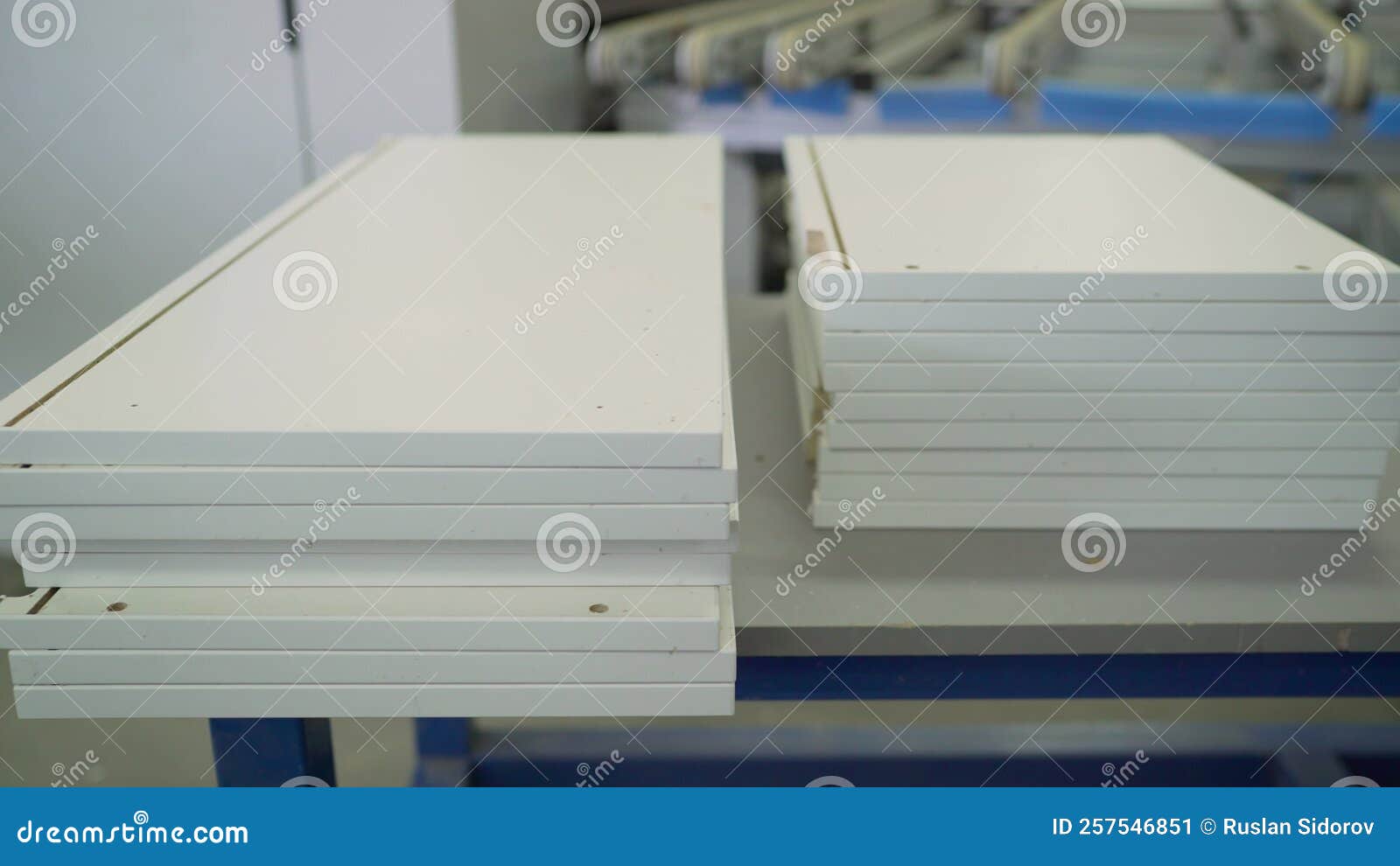 There is a Stack of OSB Sheets on the Table. Construction Material. OSB ...