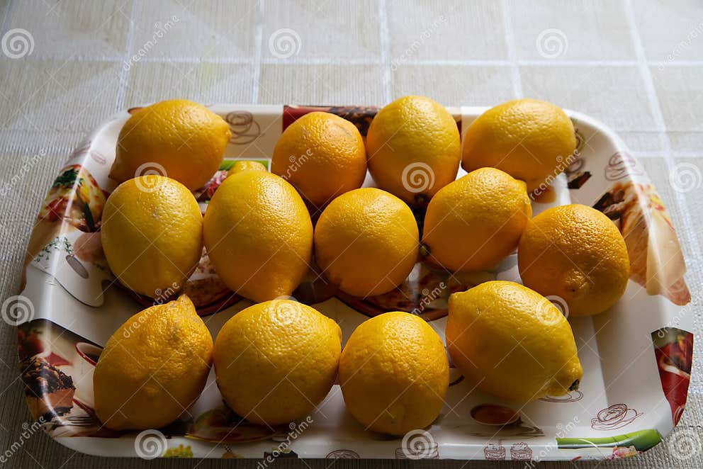 There is a Tray of Lemons on the Table. Stock Image - Image of citrus ...