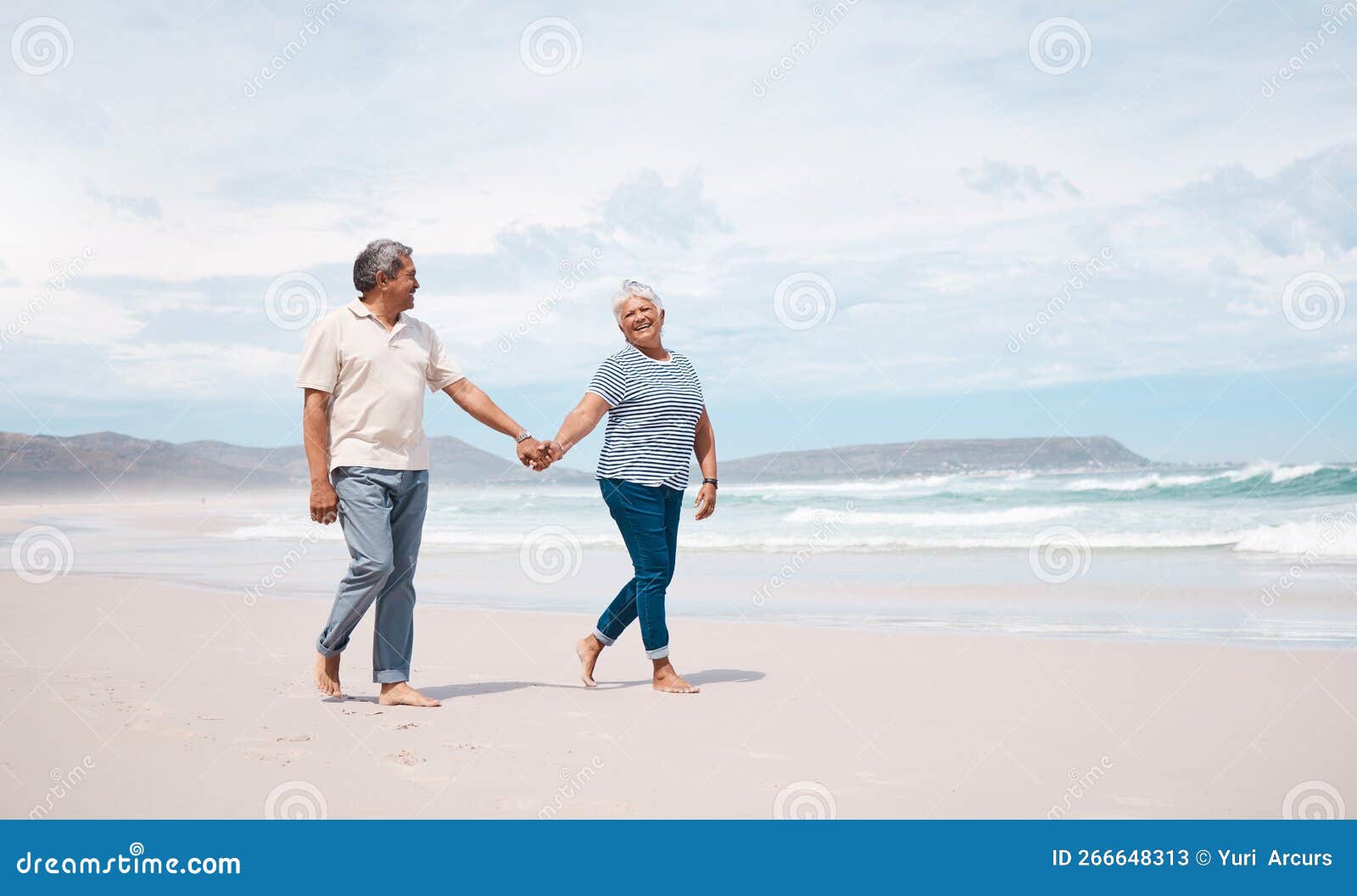Theres always Time for a Stroll on the Beach. a Senior Couple Taking a ...