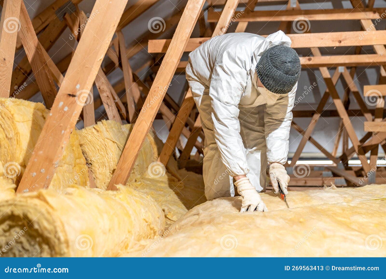 Thermal Insulation of Roof Spaces with Glass Wool Stock Image - Image ...