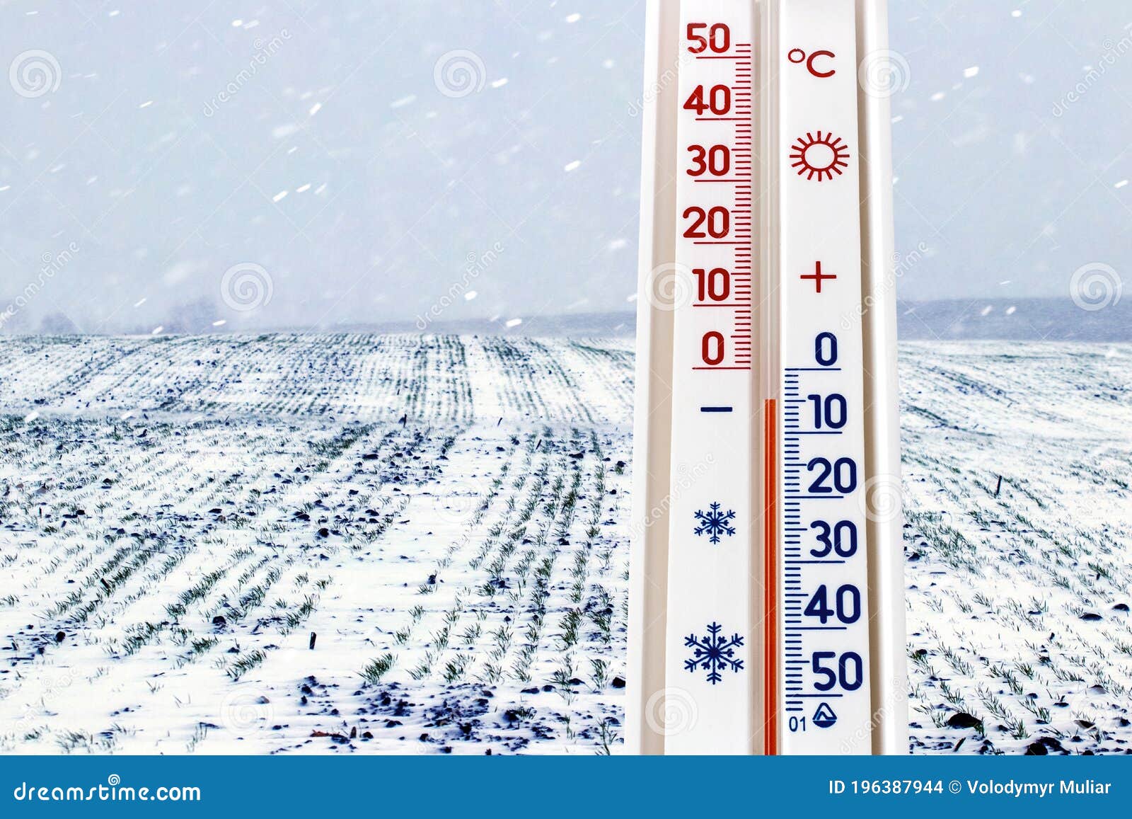 The Thermometer on the Background of the Field during the Snowfall ...