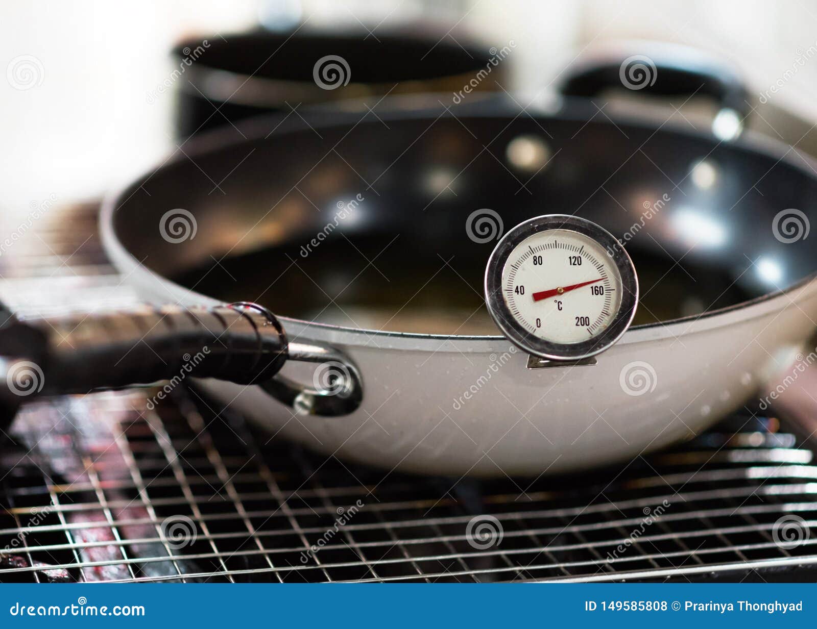 Thermometer for Food, Dial Thermometer in Heating Water Stock Photo ...