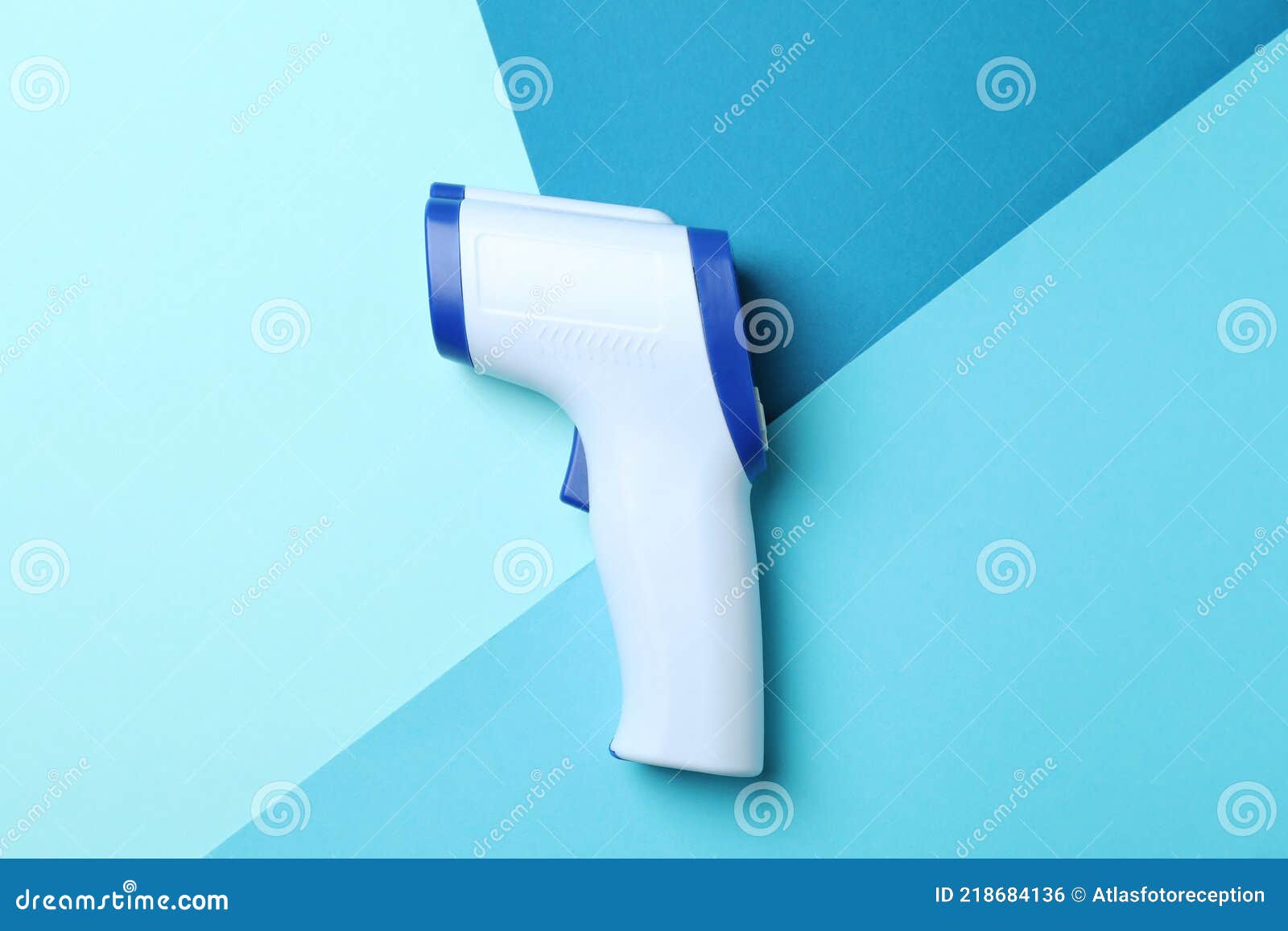 Thermometer Gun on Three Tone Background, Close Up Stock Photo - Image ...