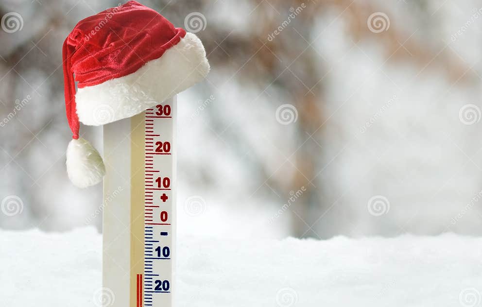 Thermometer Inserted into the Snow and a Stylized Christmas Hat Stock ...