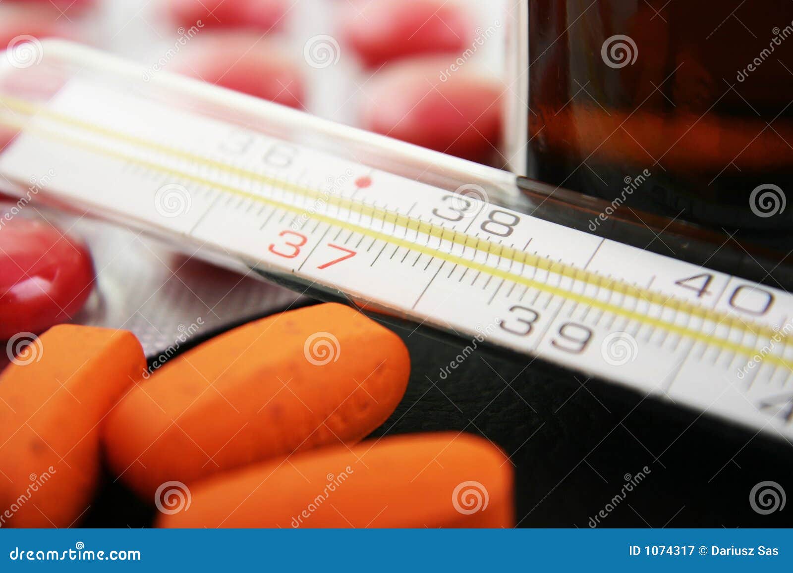 Thermometer and medication stock image. Image of medicament - 1074317