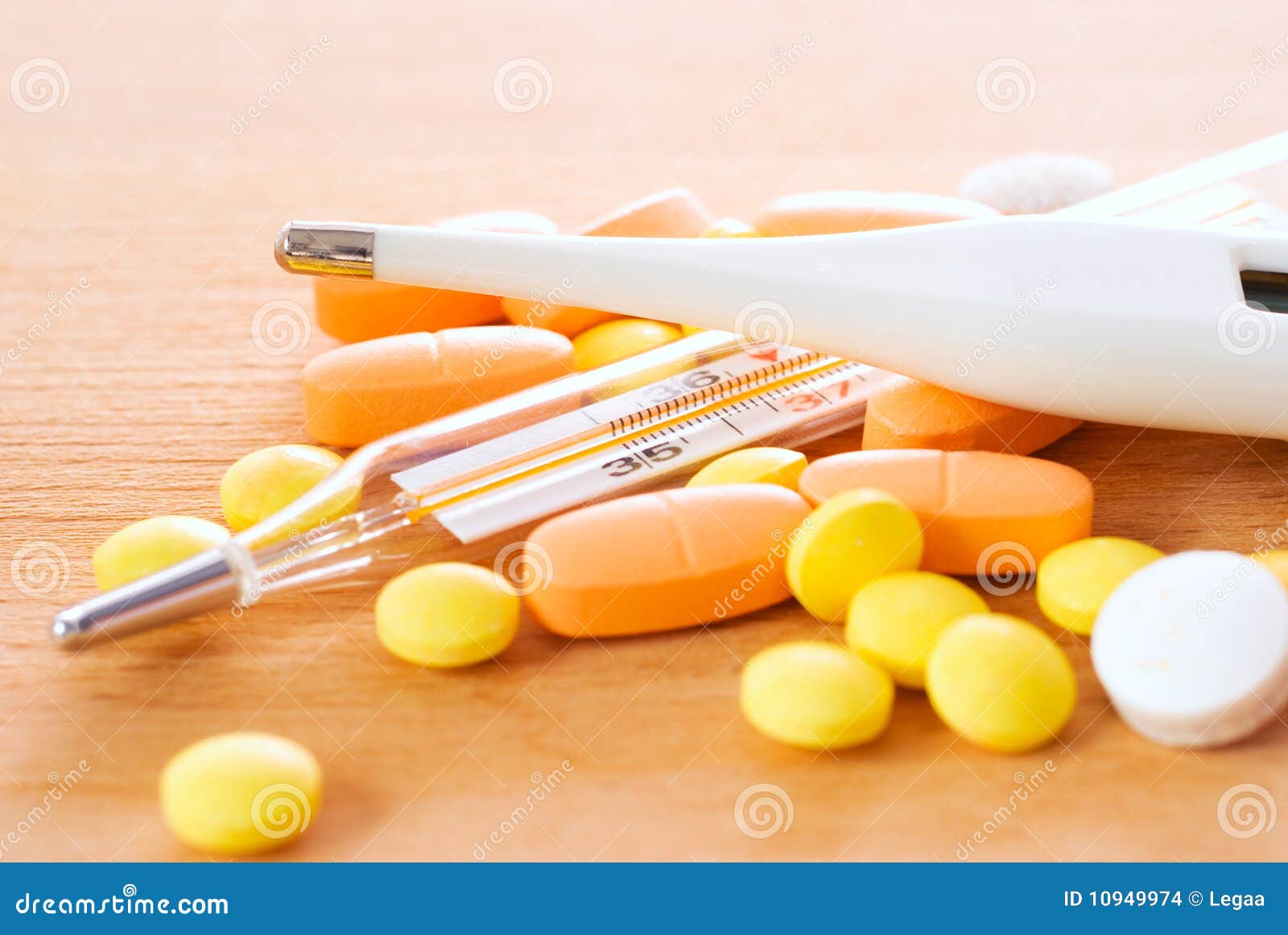 Thermometer and pills stock photo. Image of backgrounds - 10949974