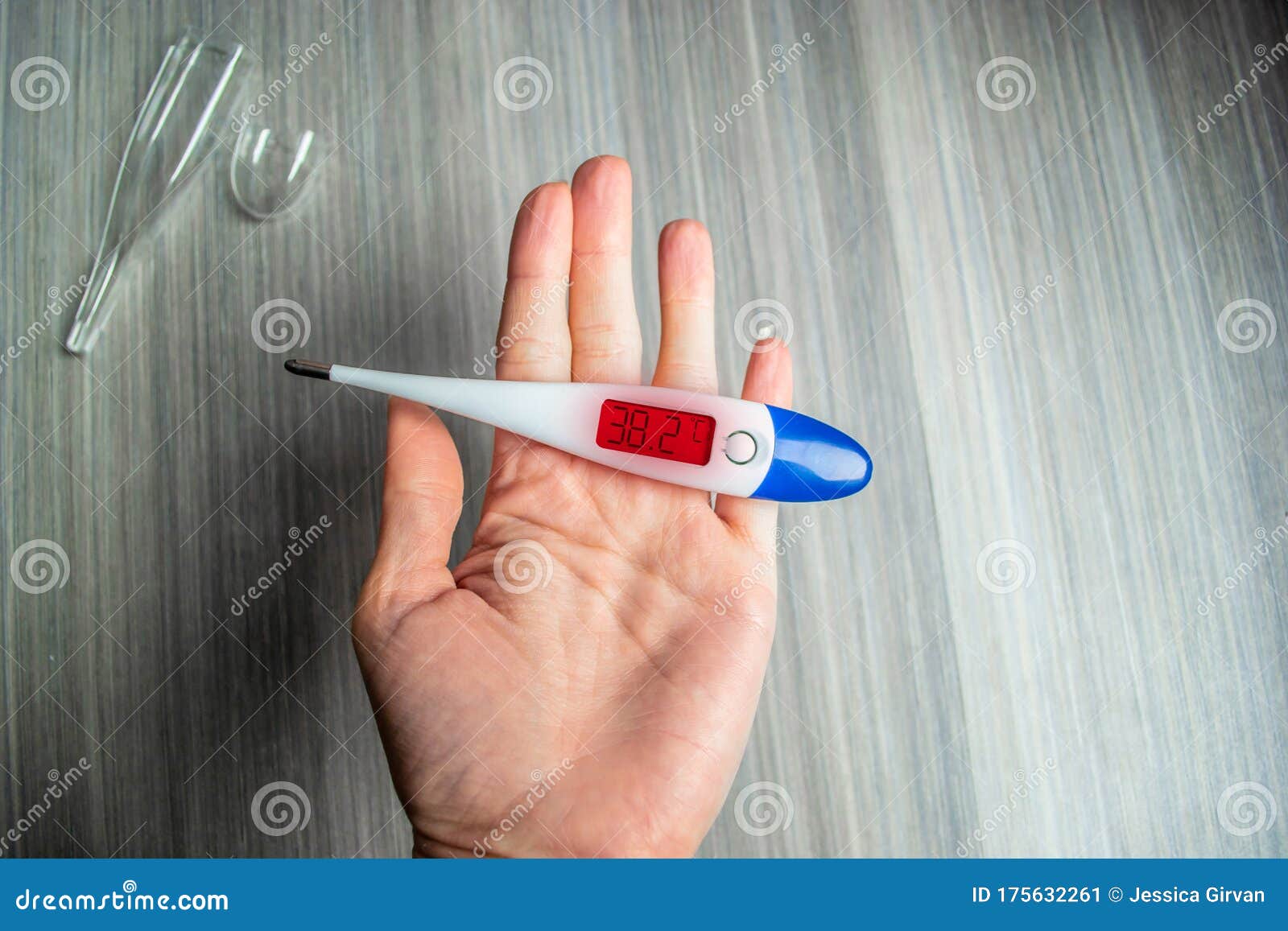 Thermometer Reading a High Temperature during the Coronavirus Outbreak ...