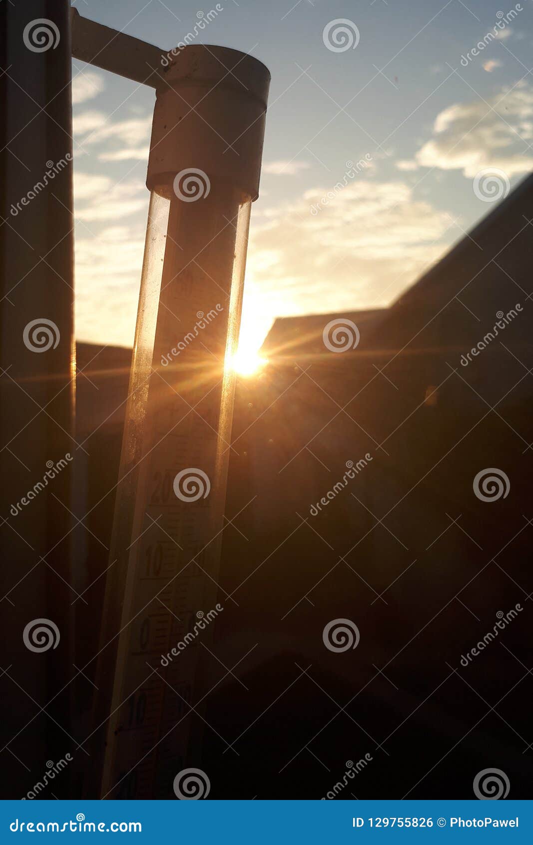 A Thermometer that Shines the Sun. the Rays of the Sun Fall on the ...