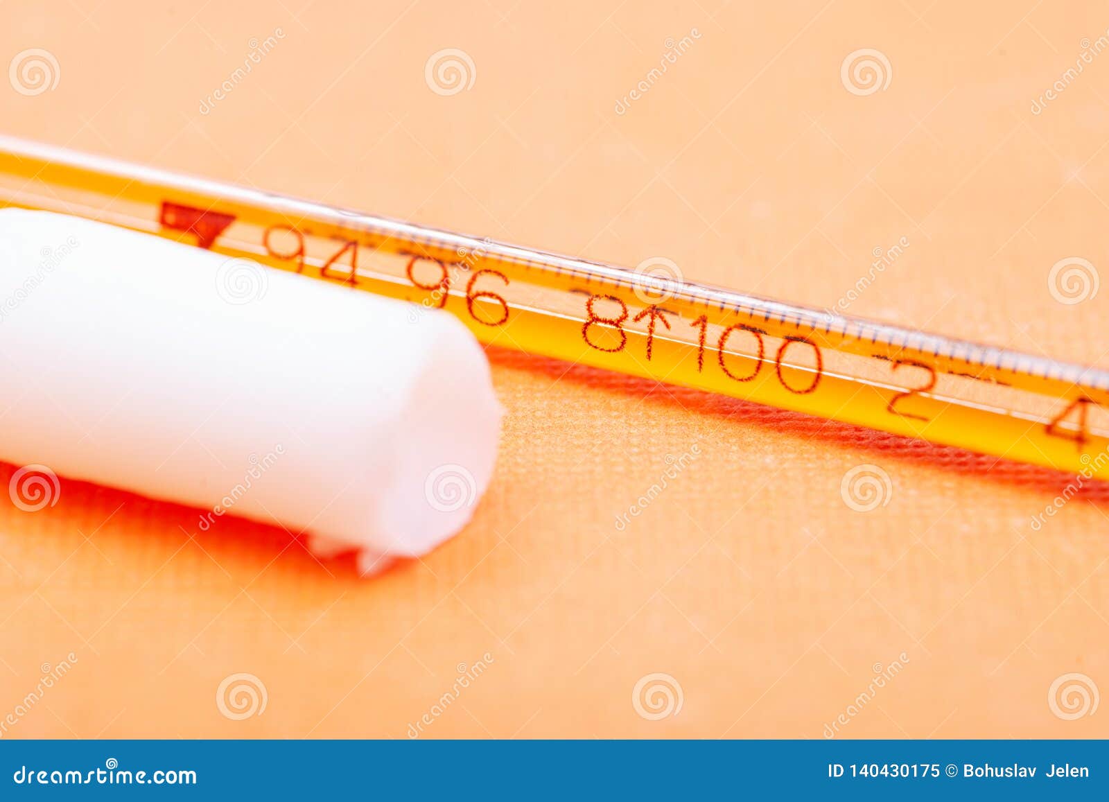 Thermometer and Suppository Medication on Orange. Rectal Drug ...