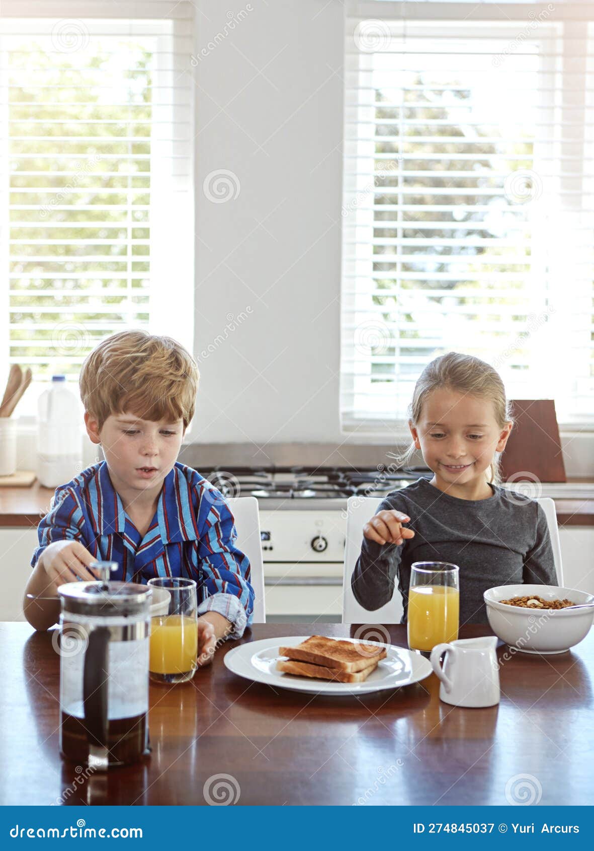 Theyre so Adorable. Two Siblings Having Breakfast Together at Home ...