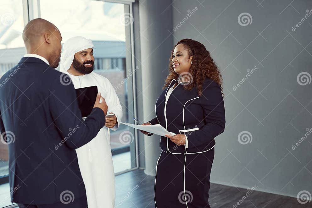 Theyre All on the Same Page. a Group of Diverse Business Colleagues ... Theyre All on the Same Page. a Group of Diverse Business Colleagues ...