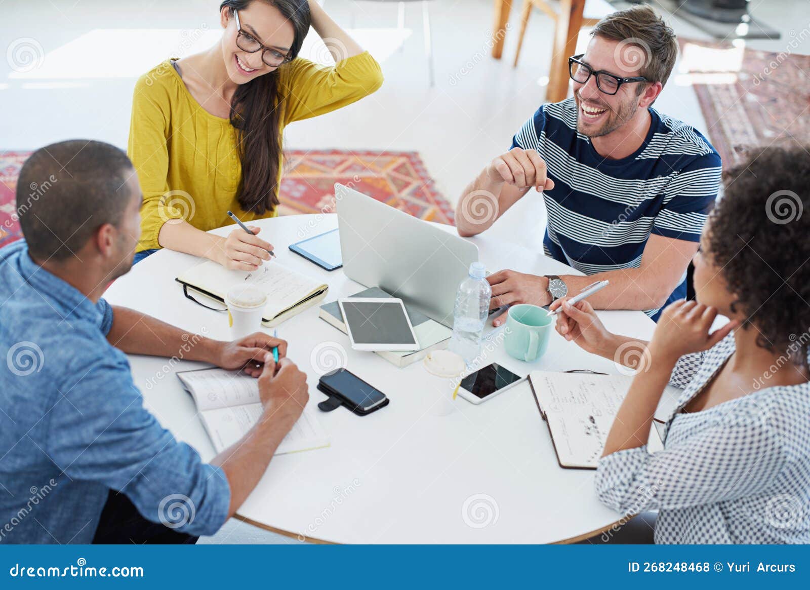 Theyre a Close-knit Team. a Group of Designers at Work in an Office ...