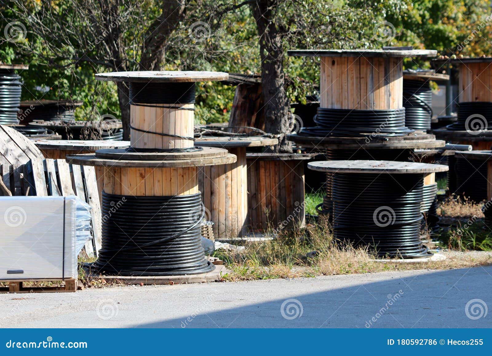 Thick Black Electrical Cable on Various Sizes Industrial Wooden Cable ...