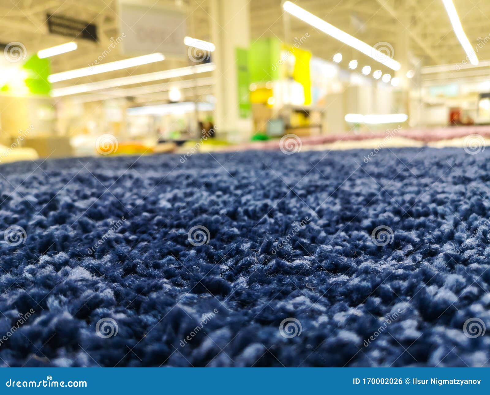 Thick Blue Carpet with a Thick Pile in the Mall for Construction and ...