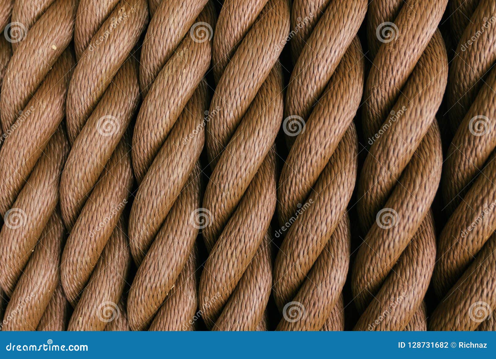 Thick Brown Rope Rolled into a Roll. Vertical Layout Stock Photo ...