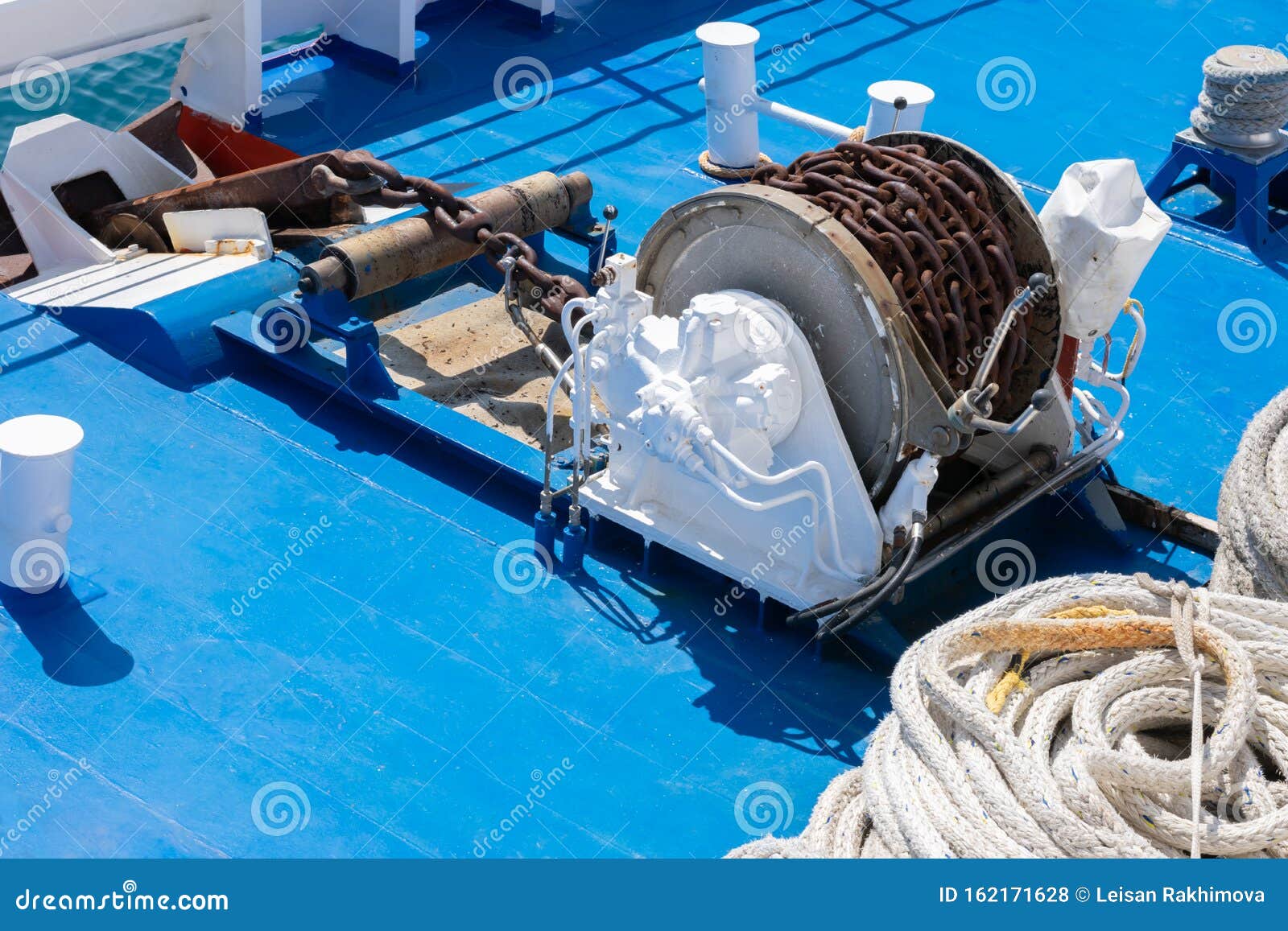 Thick Chain with Anchor is Coiling while Mooring Stock Photo - Image of ...