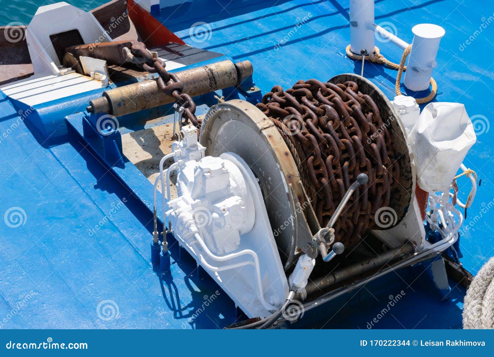 Thick Chain with Anchor is Coiling while Mooring Stock Photo - Image of ...