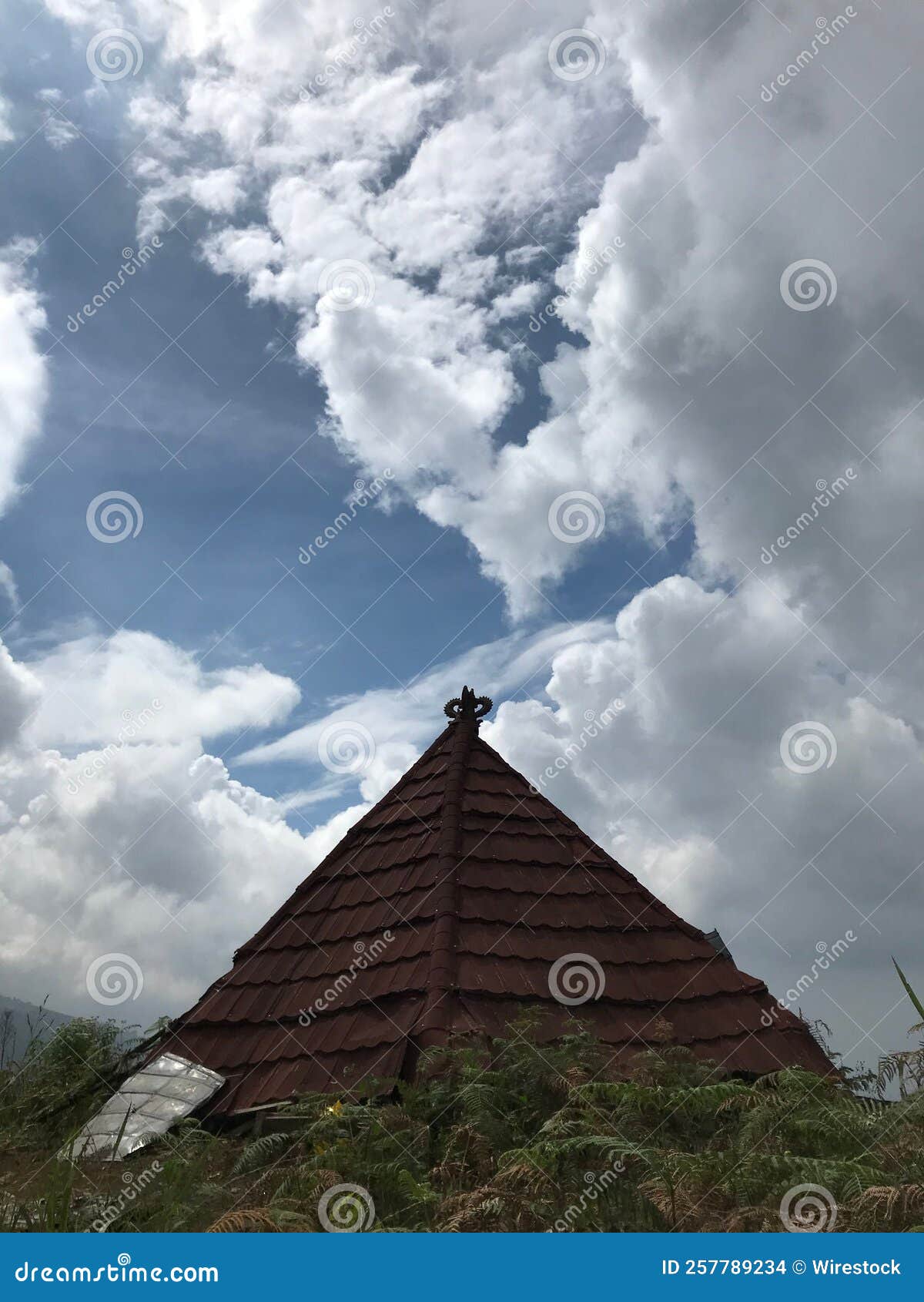 Thick Clouds in the Sky Over the House Roof Stock Photo - Image of view ...