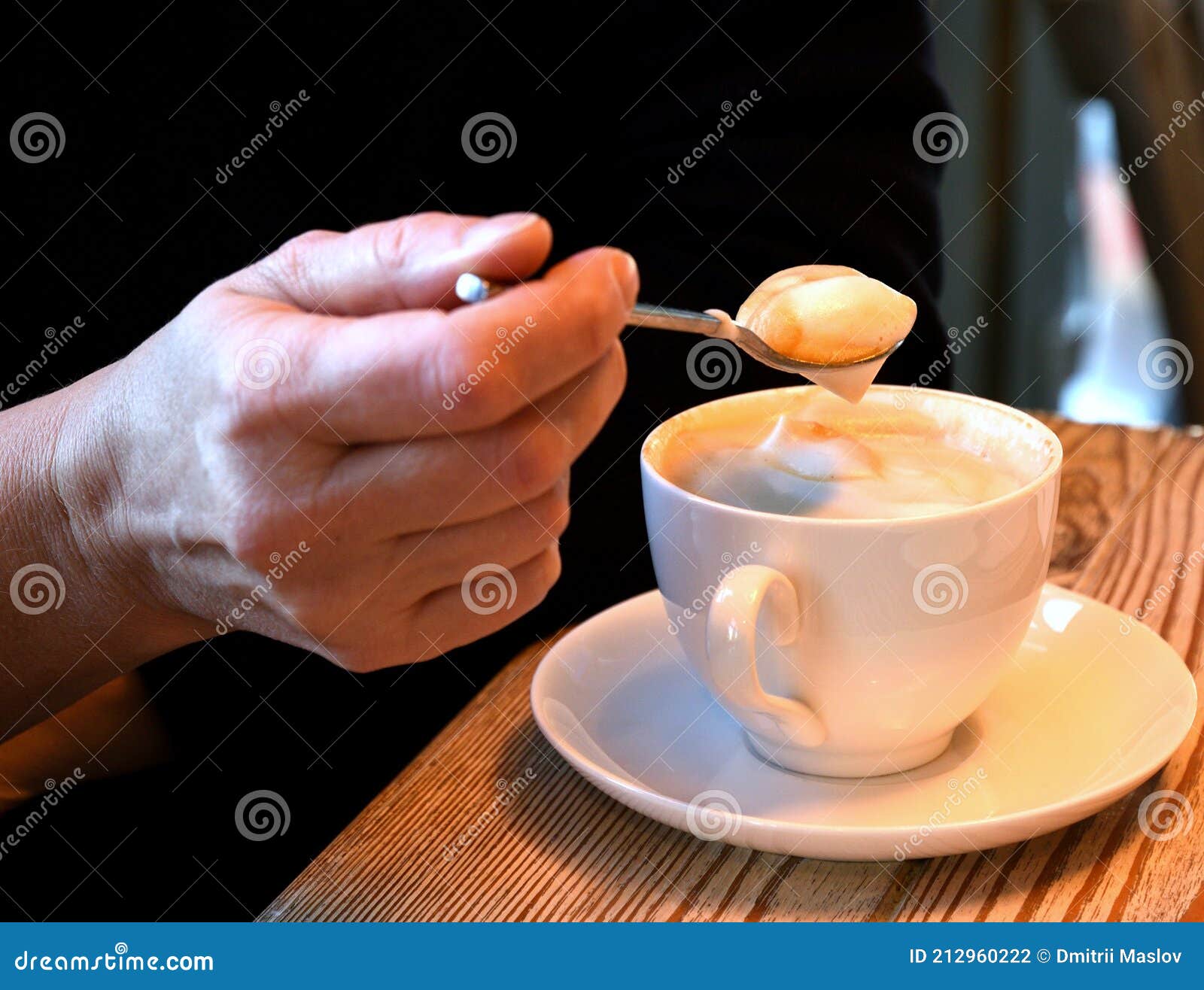 Thick Coffee Foam on a Teaspoon with a Cup of Coffee Stock Photo ...